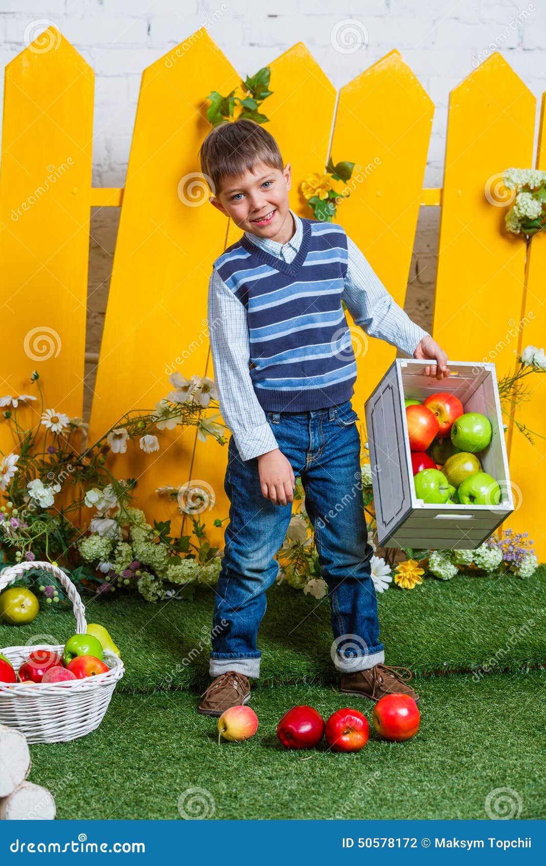 Spring boy with apples stock photo. Image of grass, baby - 50578172