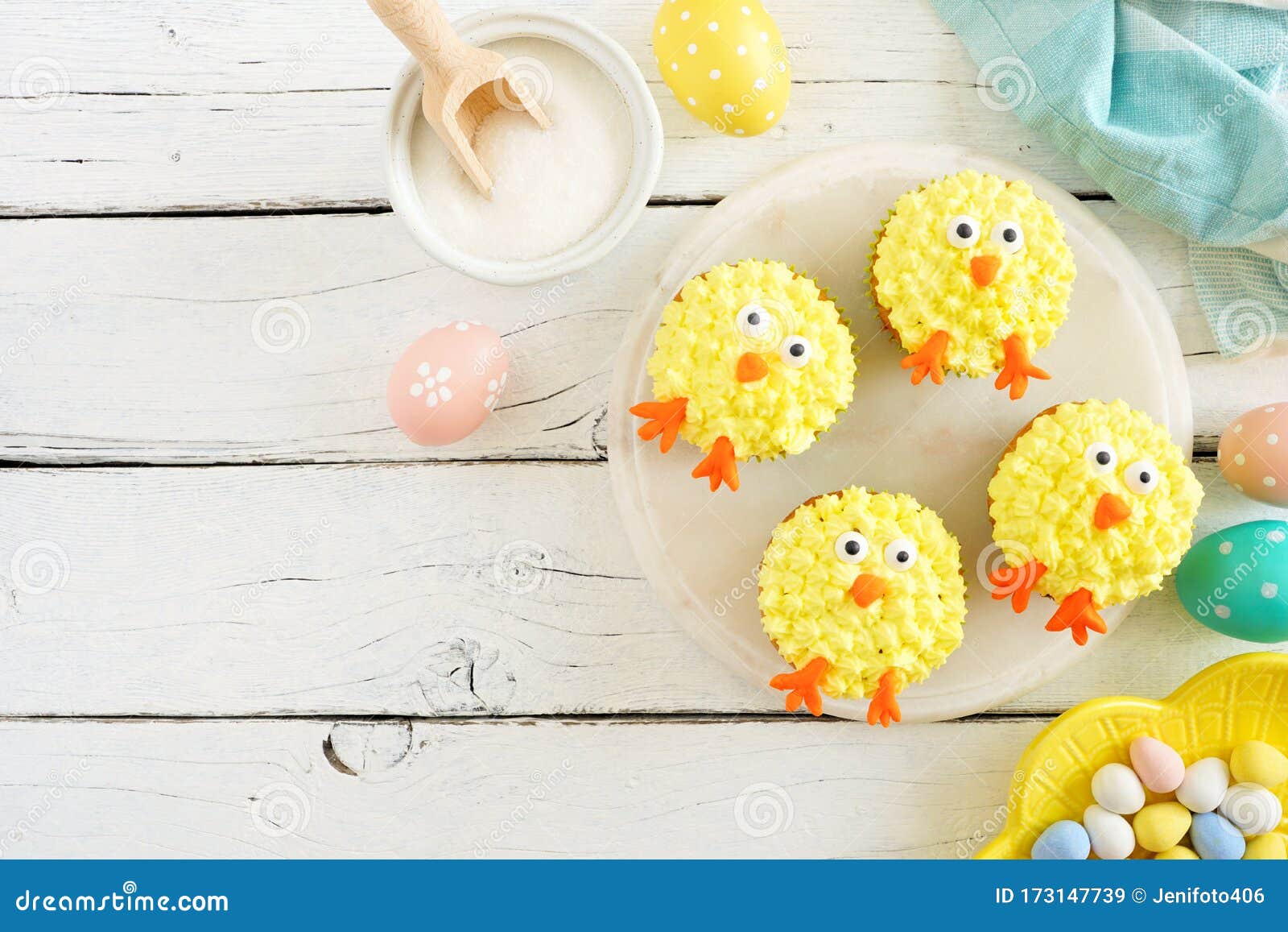 Spring Chick Cupcakes, Top View Corner Border with Copy Space Over a ...