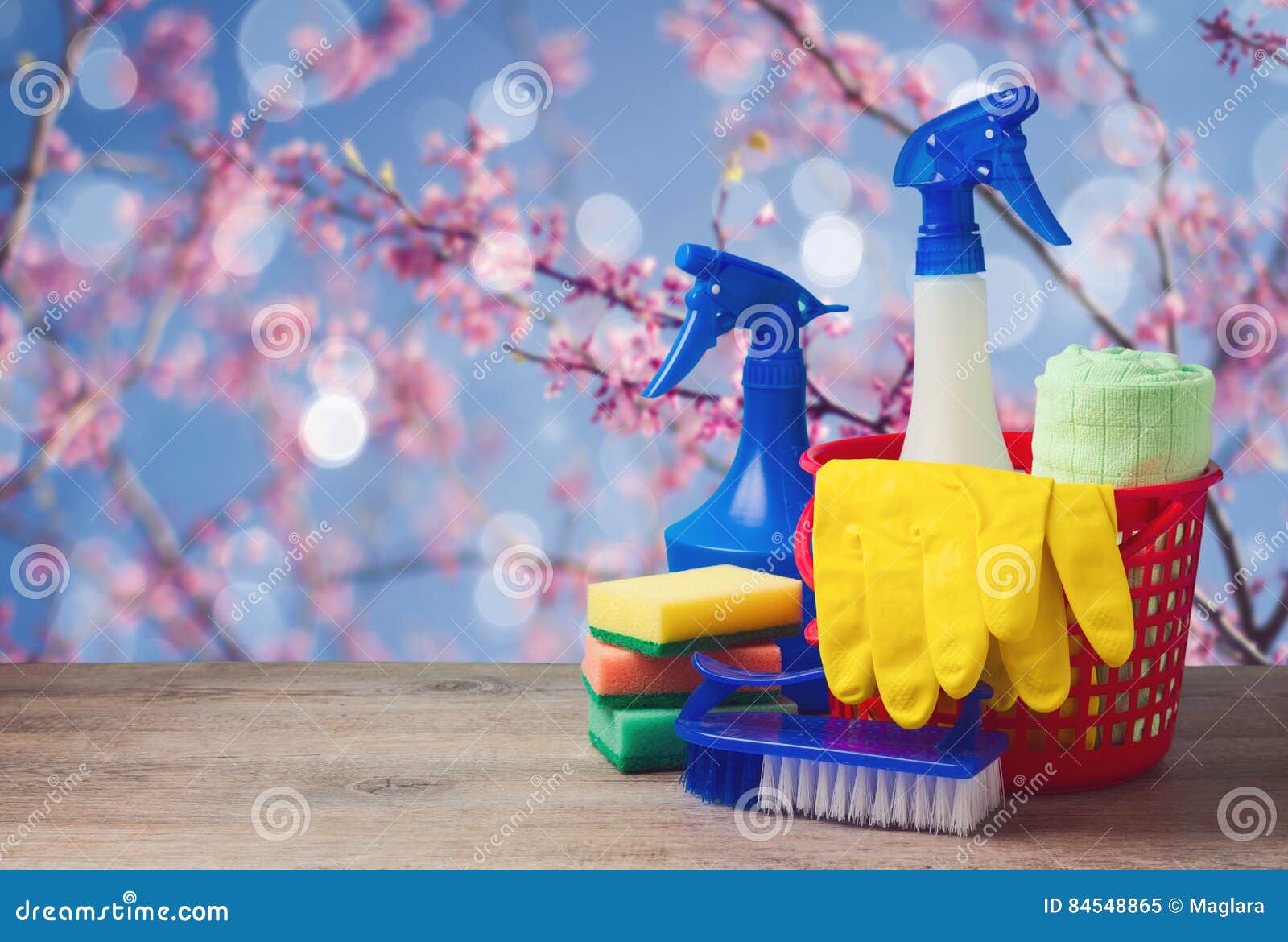 Spring Cleaning Concept with Supplies Over Floral Background Stock ...