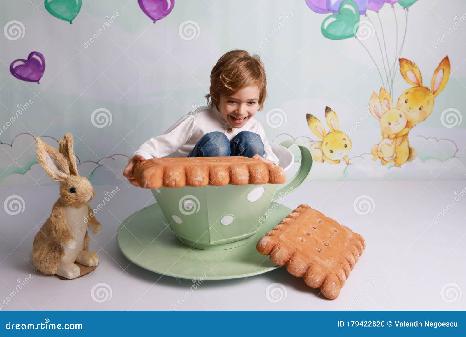 Child in tea cup stock photo. Image of bakery, filling - 179422820