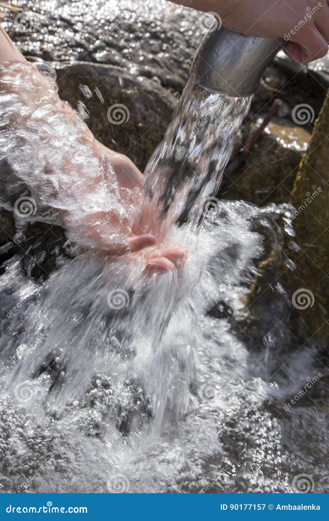Spring Drinking Water Stream Pouring from Pipe on Hand Stock Image ...