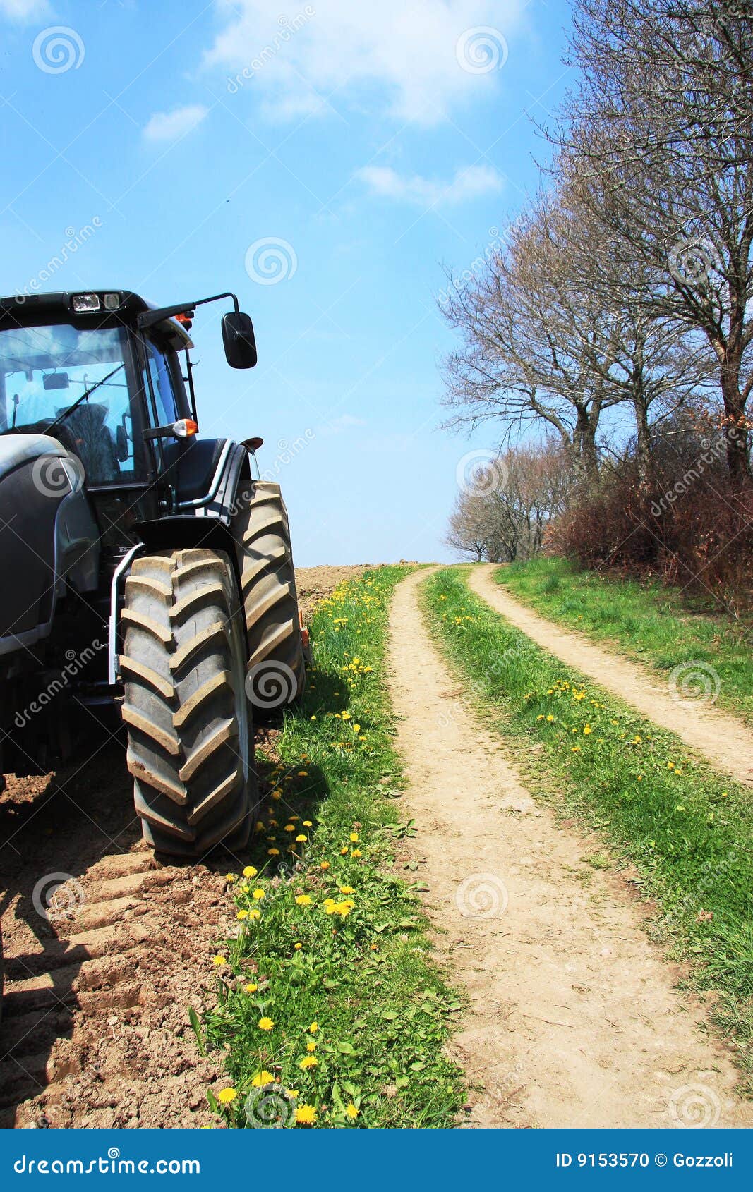 Spring Farm Lane and Tractor Stock Photo - Image of plow, rubber: 9153570