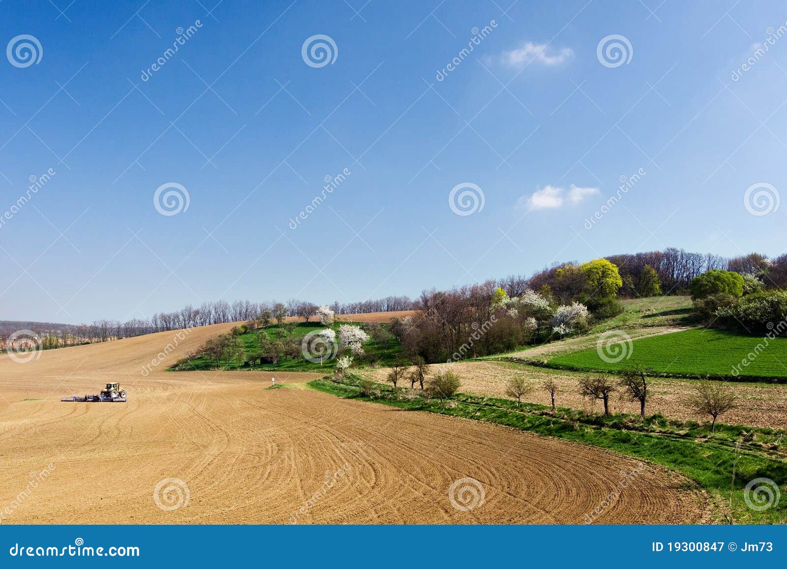 Spring Farmland with Tractor Stock Image - Image of rural, furrow: 19300847