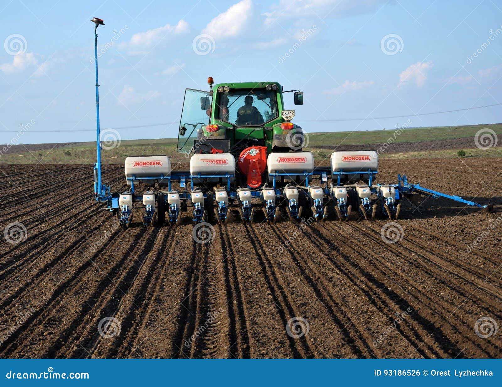 Spring field and drill editorial photo. Image of clouds - 93186526