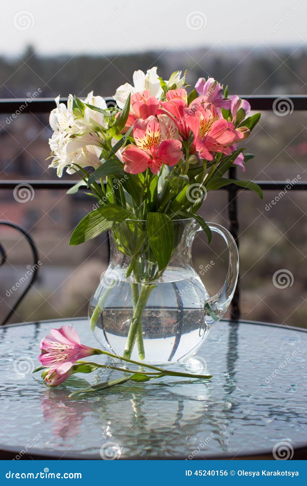 Spring Flower Bouquet in Glass Jug on Table Stock Photo - Image of ...