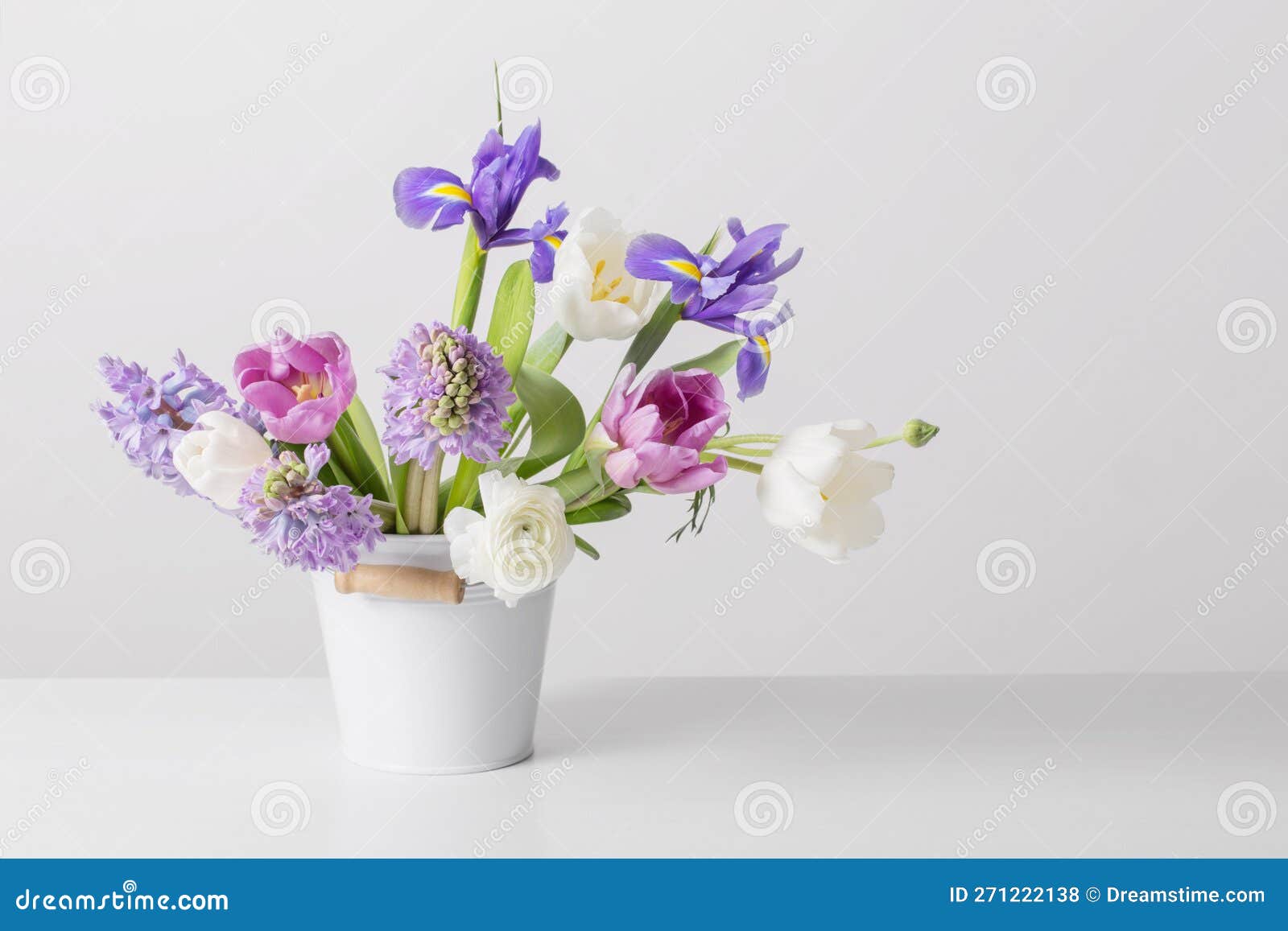 Spring Flowers in Bucket on White Background Stock Photo - Image of ...