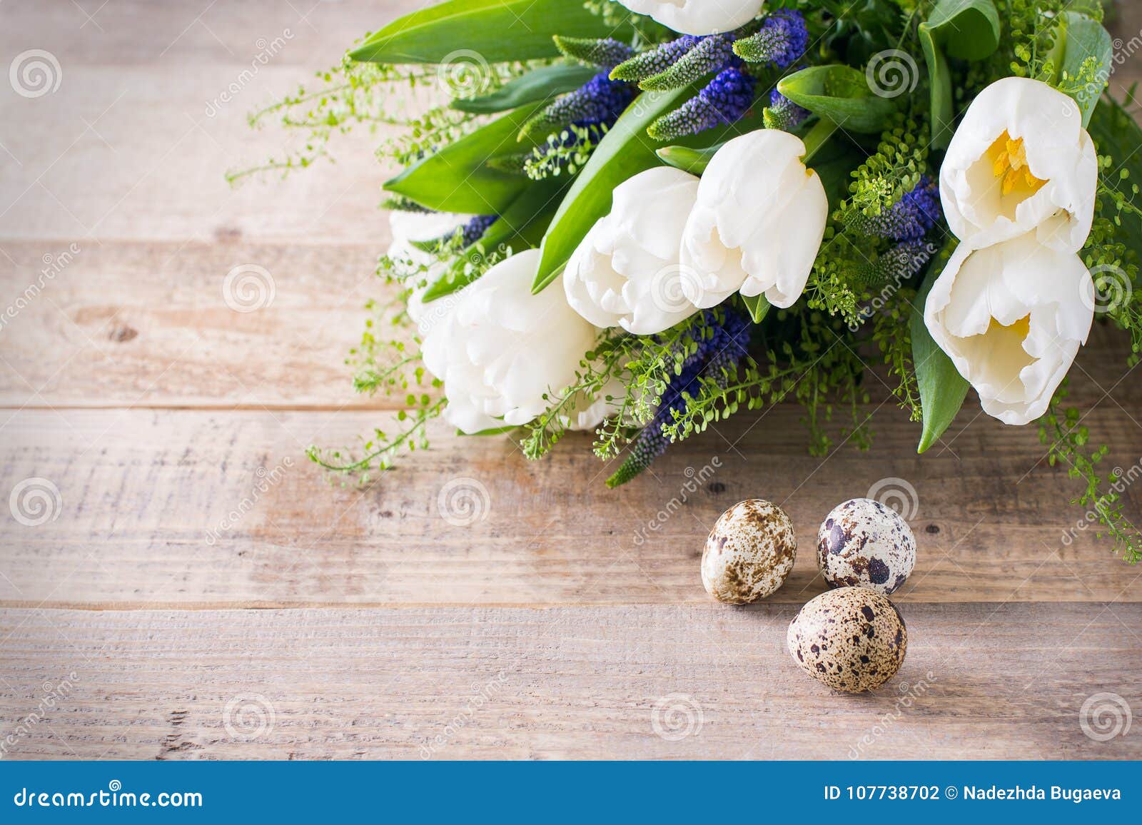 Spring Flowers with Eggs on Wooden Texture, Easter Theme Stock Photo ...