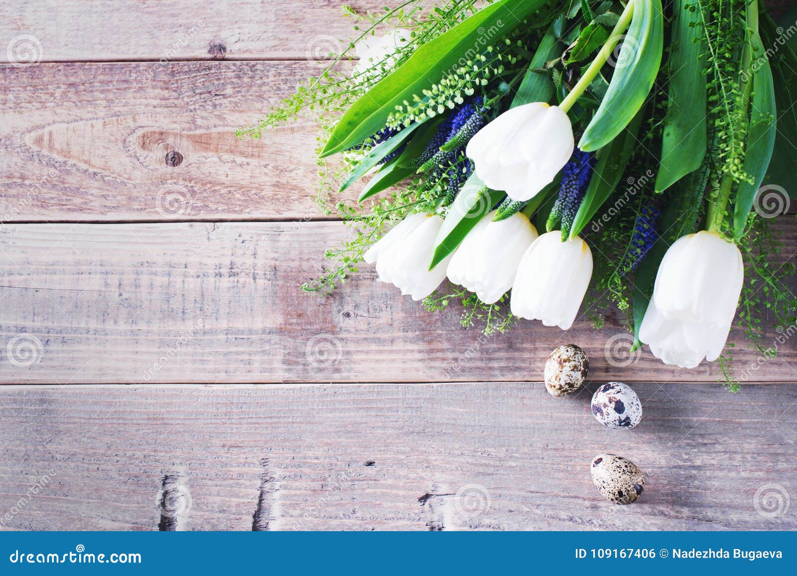 Spring Flowers with Eggs on Wooden Texture, Easter Theme Stock Photo ...