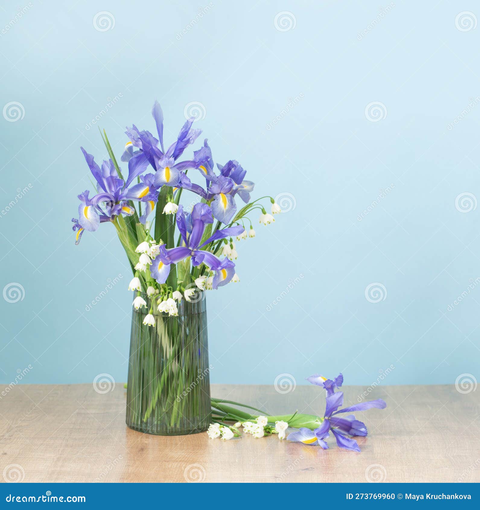 Spring Flowers in Glass Vase on Blue Background Stock Photo - Image of ...