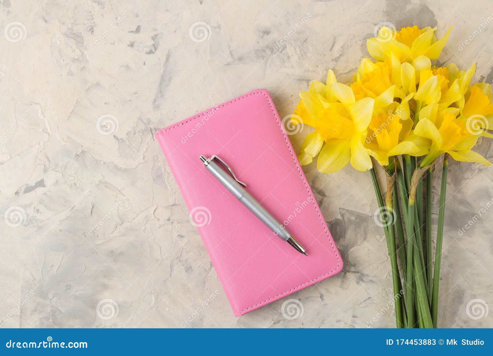 Spring Flowers, Yellow Daffodils and Notebook, on a Light Concrete ...