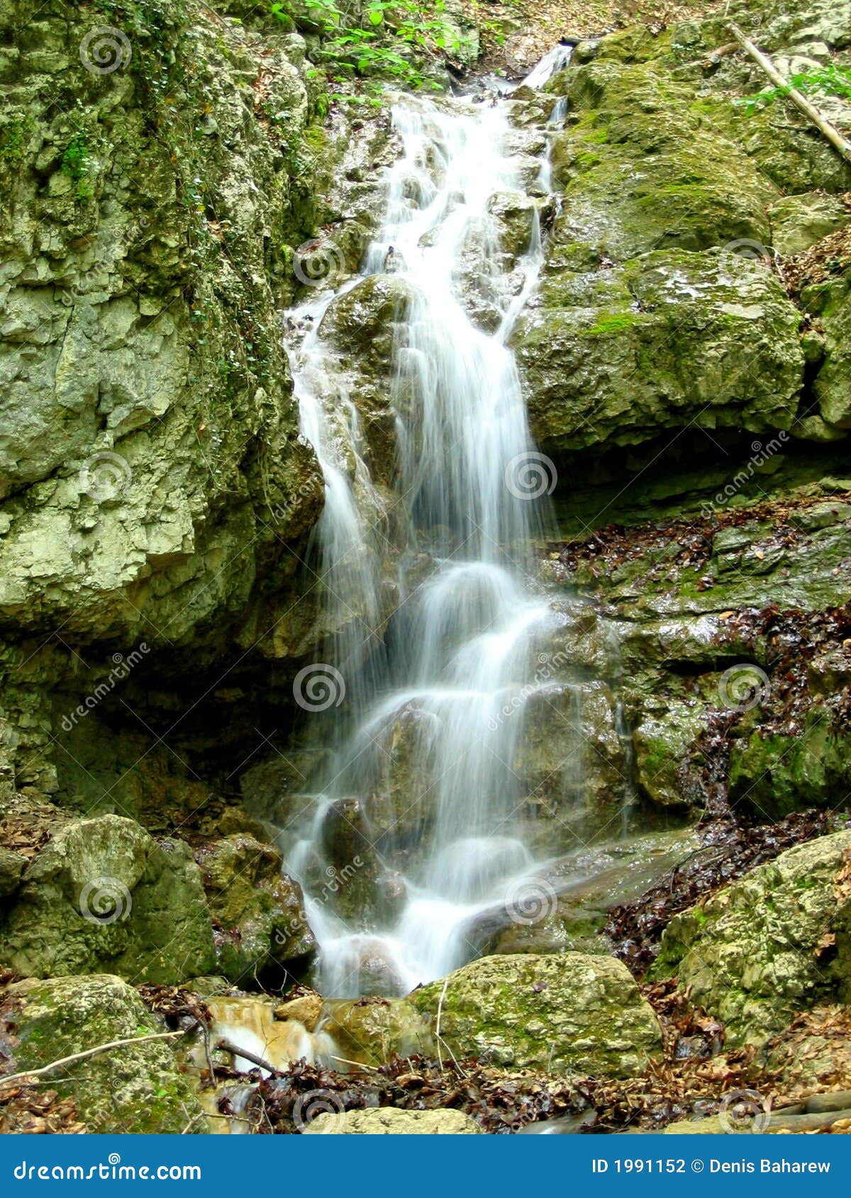 Spring flowing down rocks stock photo. Image of resurgence - 1991152