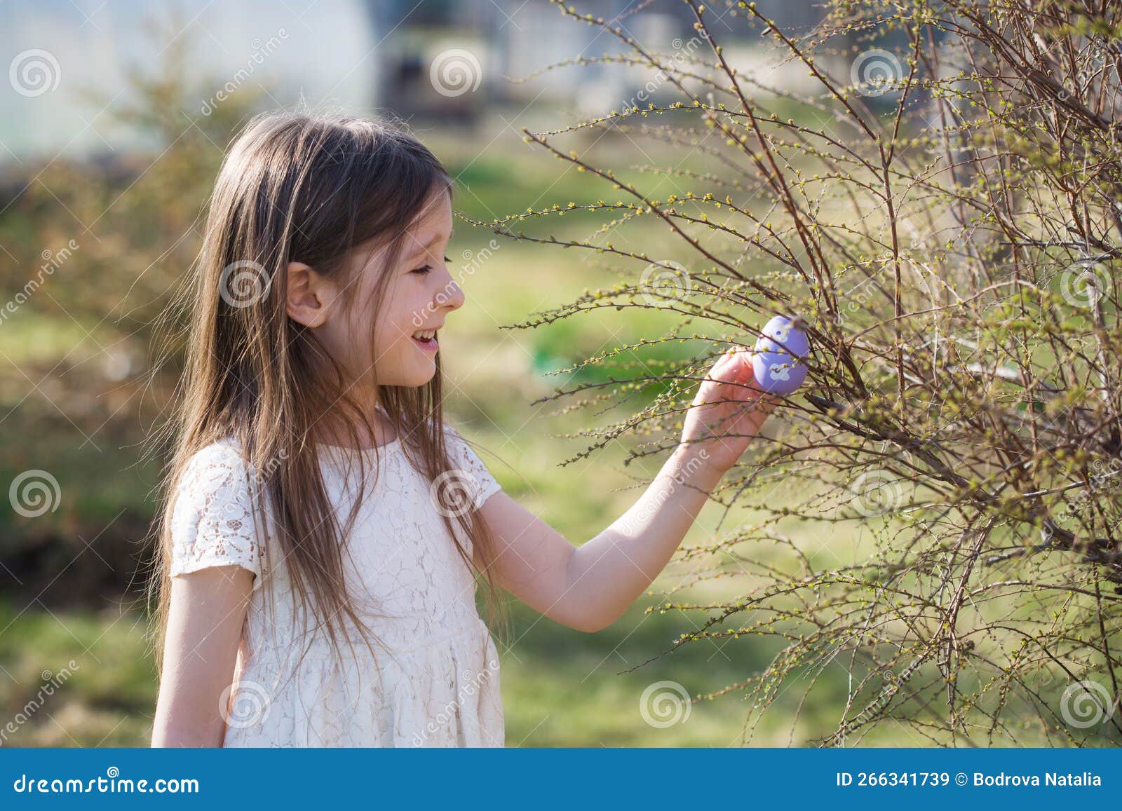 Spring Fun - Finding Eggs for Easter Outdoor in Countryside. Child ...