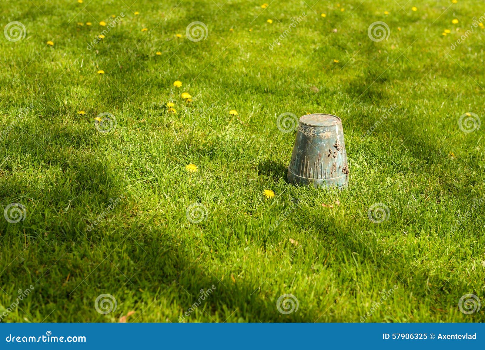 Spring Gardening - Overturned Pot Upside Down in Grass, Copyspac Stock ...