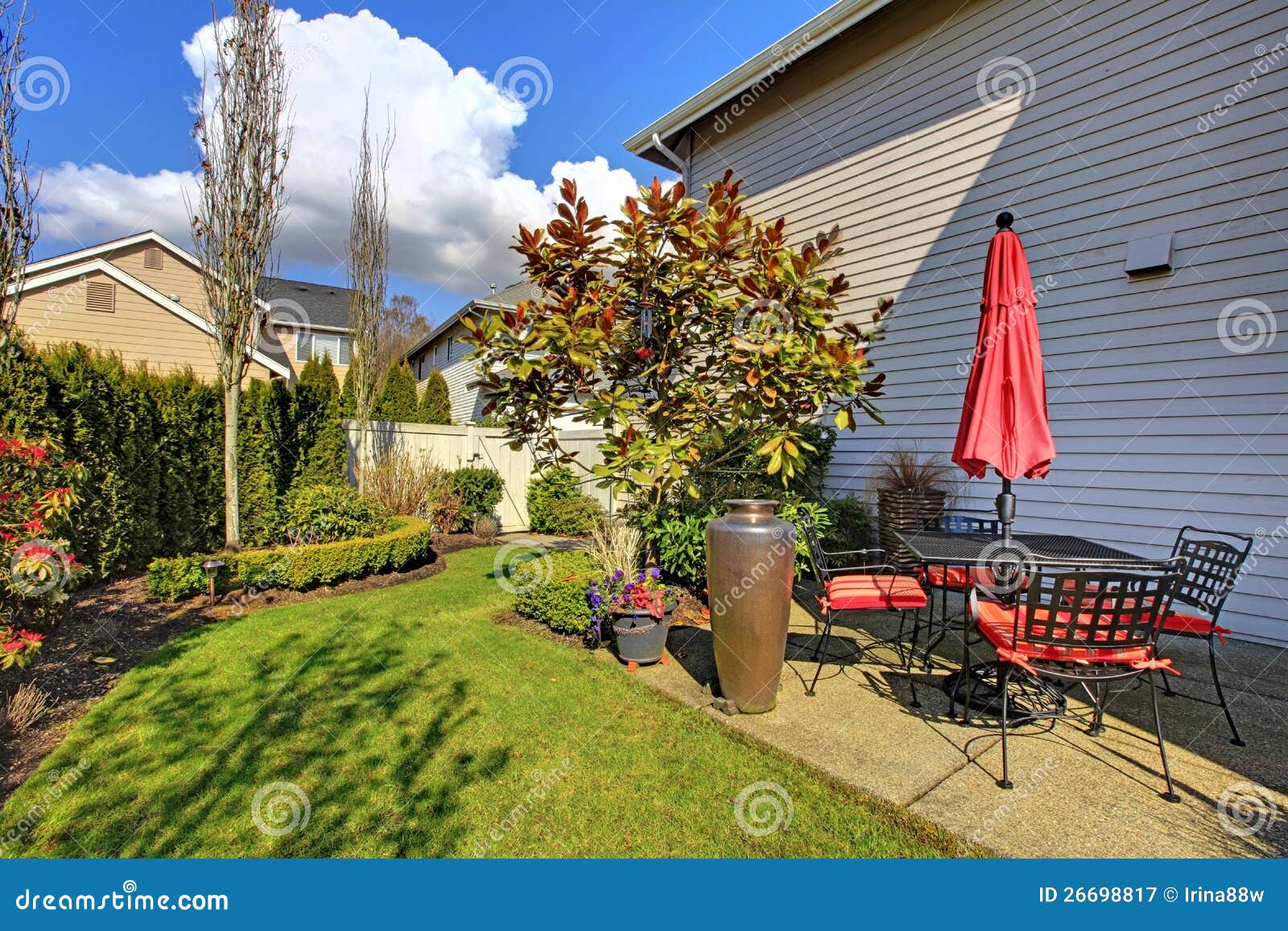 Spring House Back Yard with Red Chairs Stock Image - Image of home ...