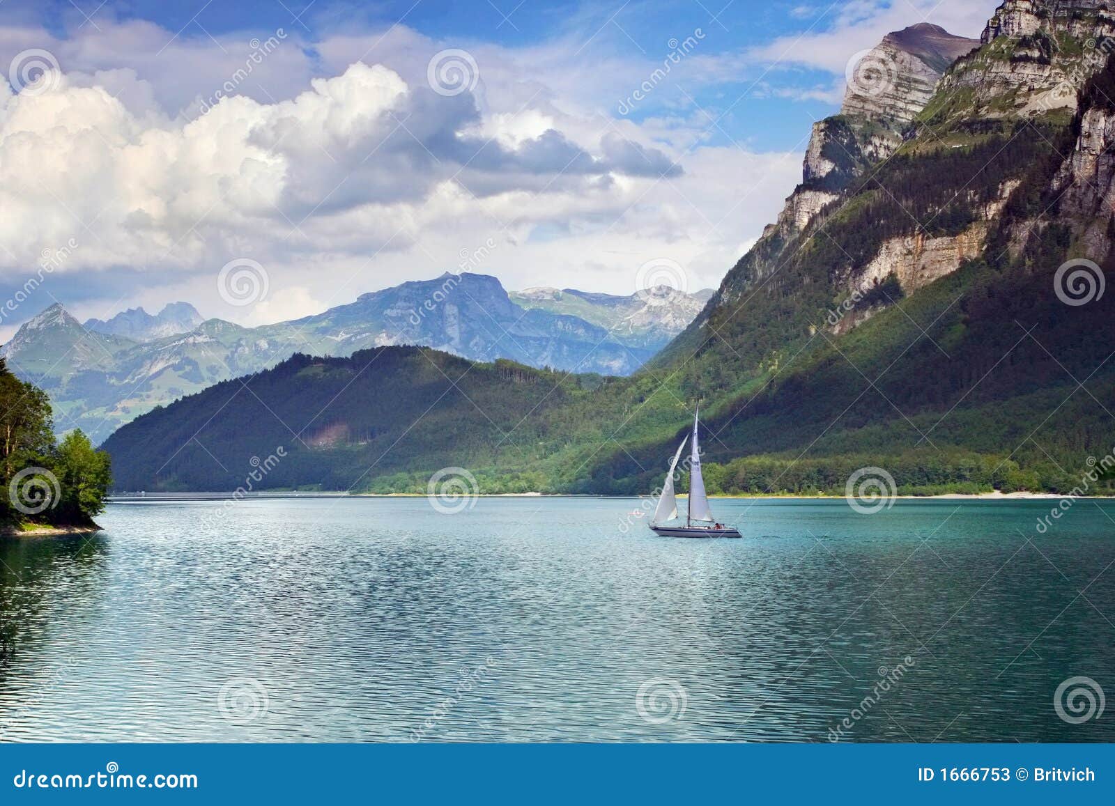 Spring lake scene stock image. Image of hillsides, snowy - 1666753