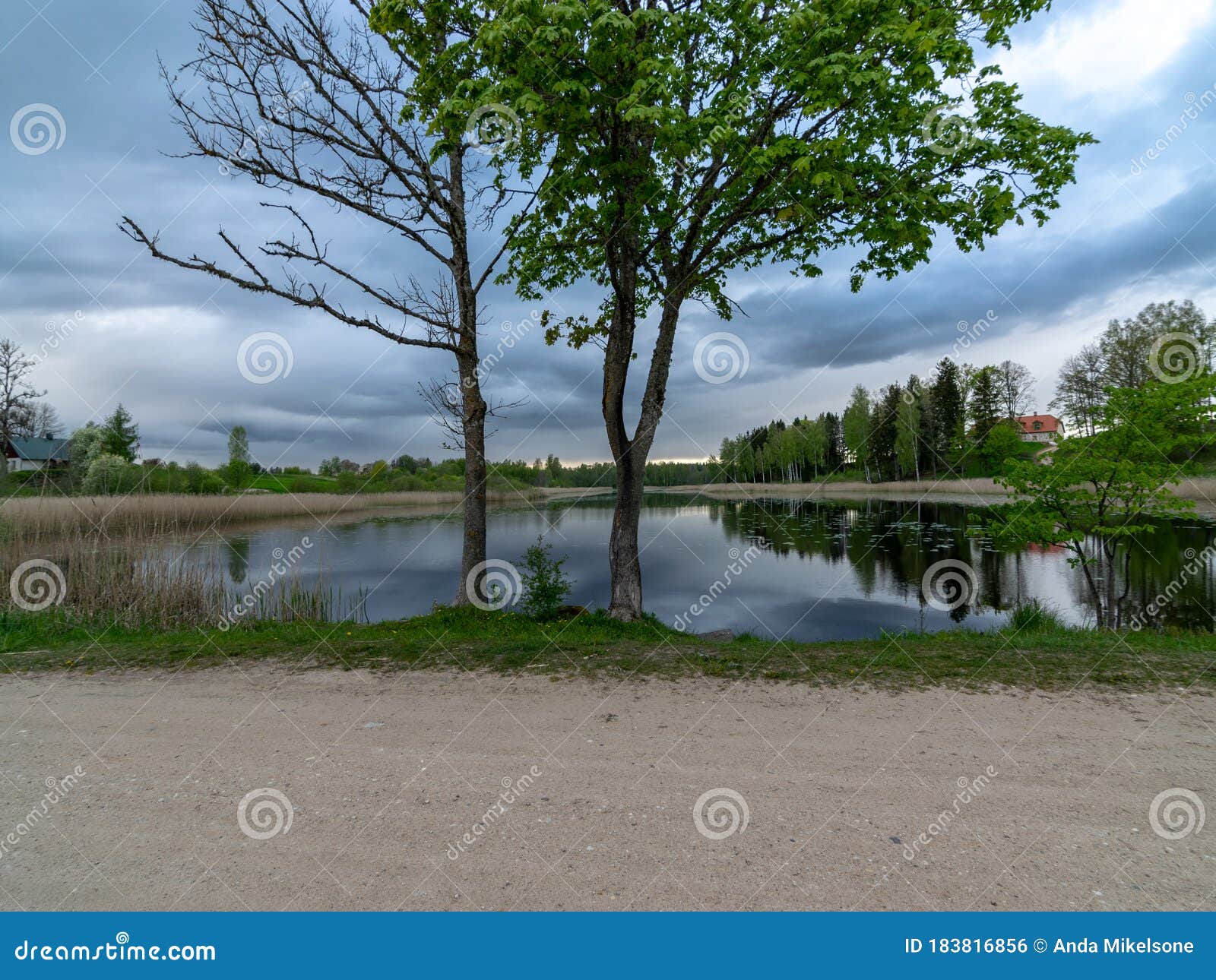 Spring Landscape with Beautiful Sky, Clouds and Tree Reflections in the ...