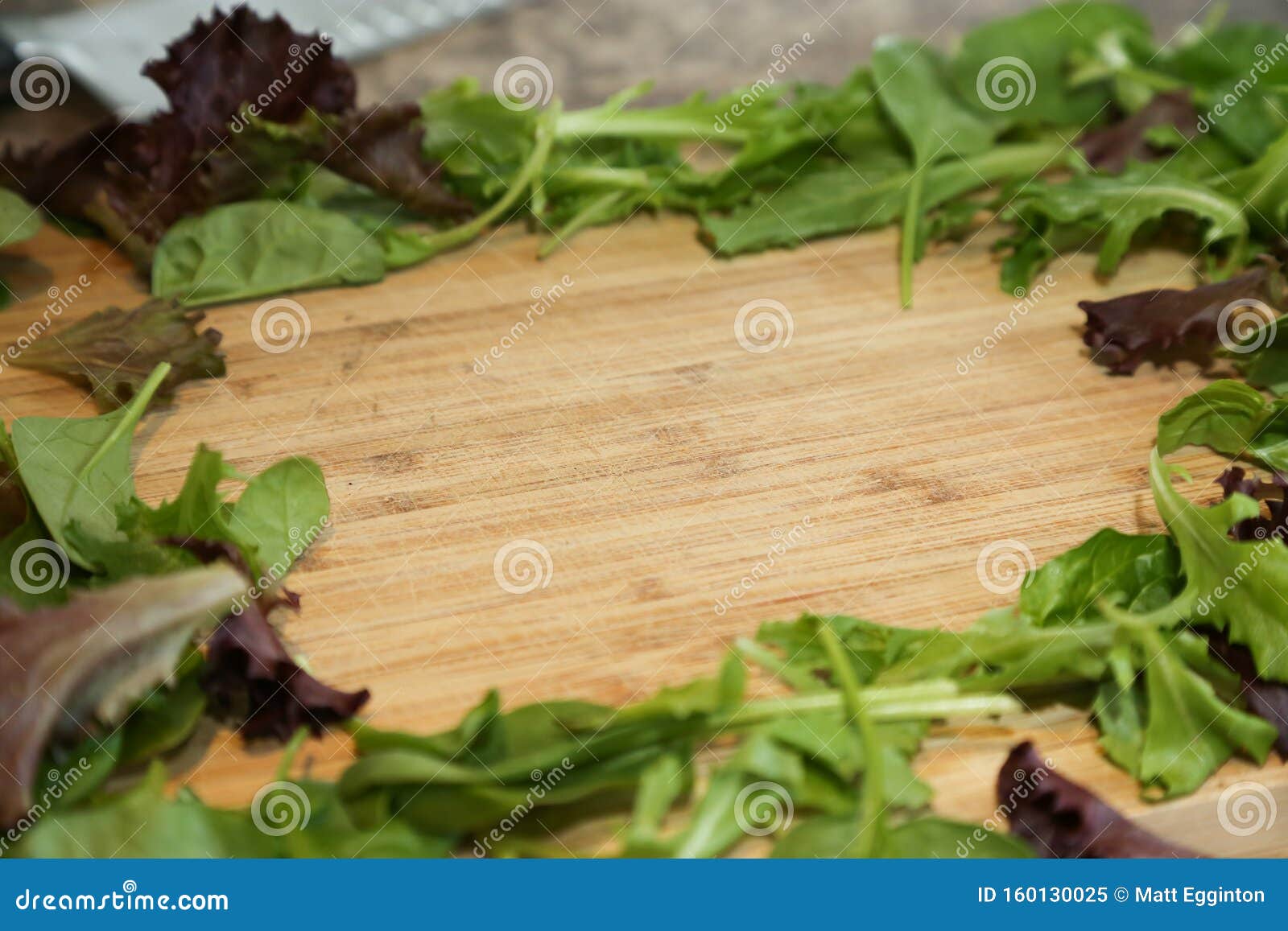 Spring Mix Lettuce Frame, Lettuce Frame on a Chopping Board Stock Image ...