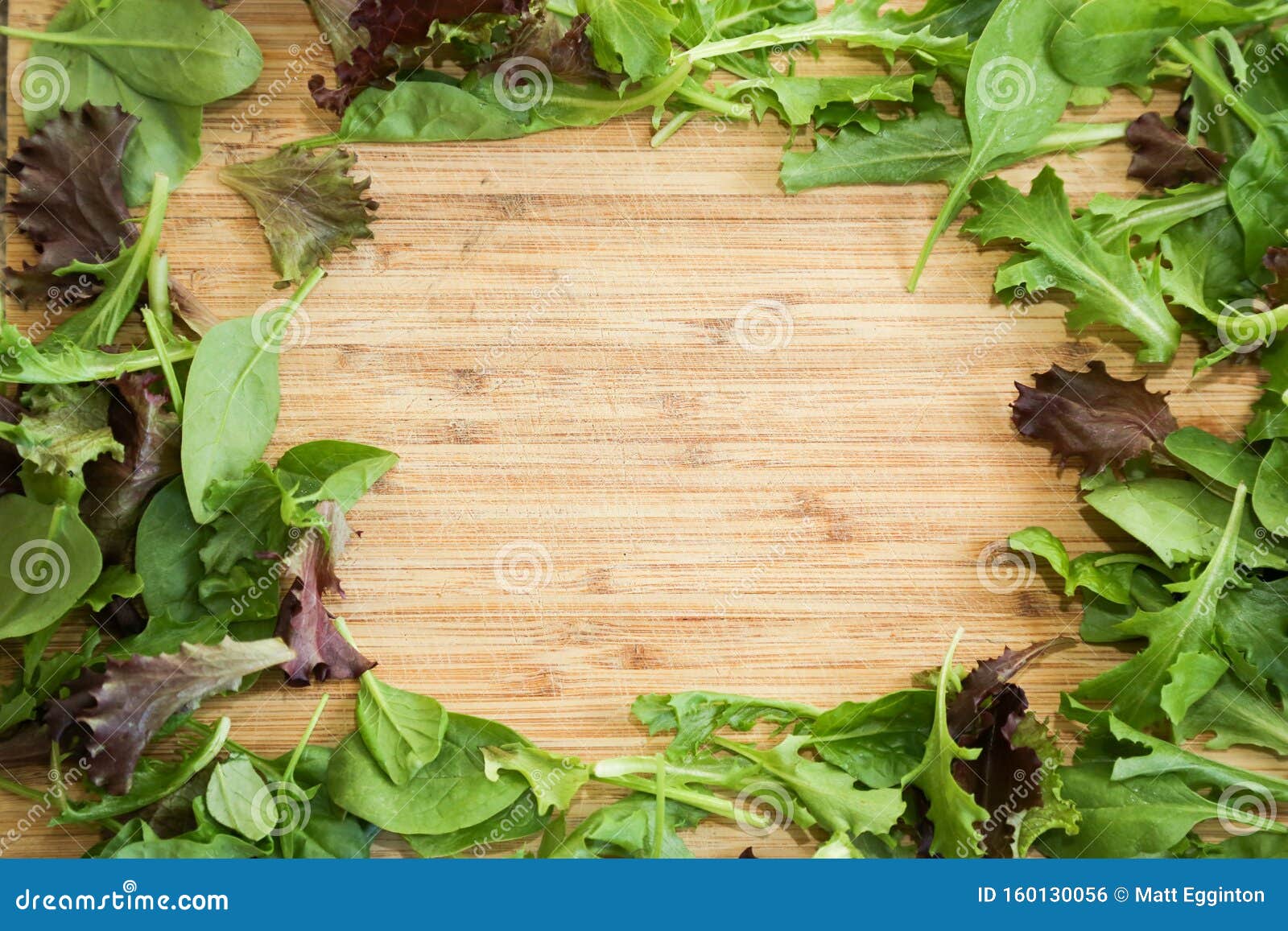 Spring Mix Lettuce Frame, Lettuce Frame on a Chopping Board Stock Photo ...