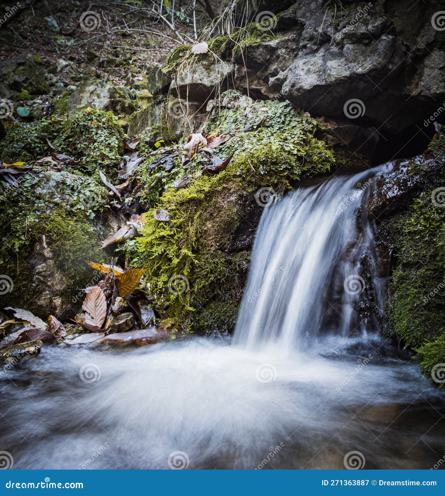 A Spring in the Mountains with Clean Drinking Water Flows from Stones ...