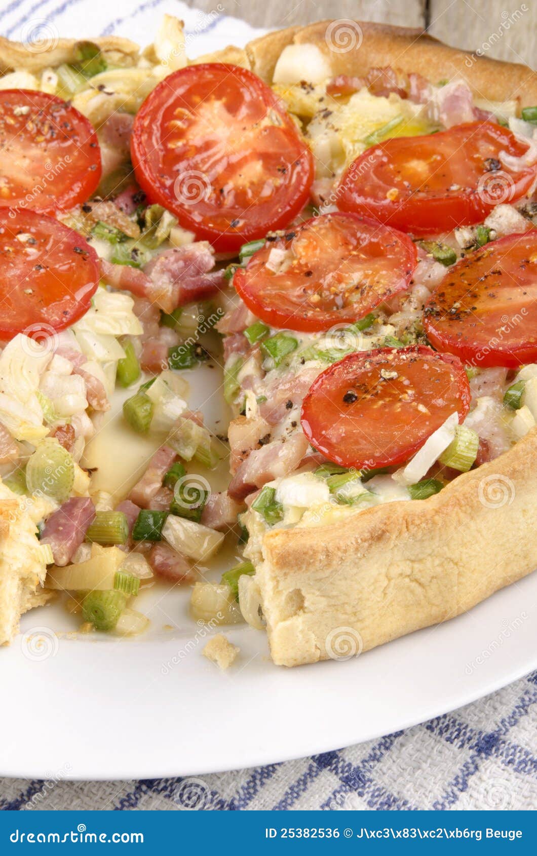 Spring Onion and Bacon Quiche with Tomato Stock Photo - Image of ...