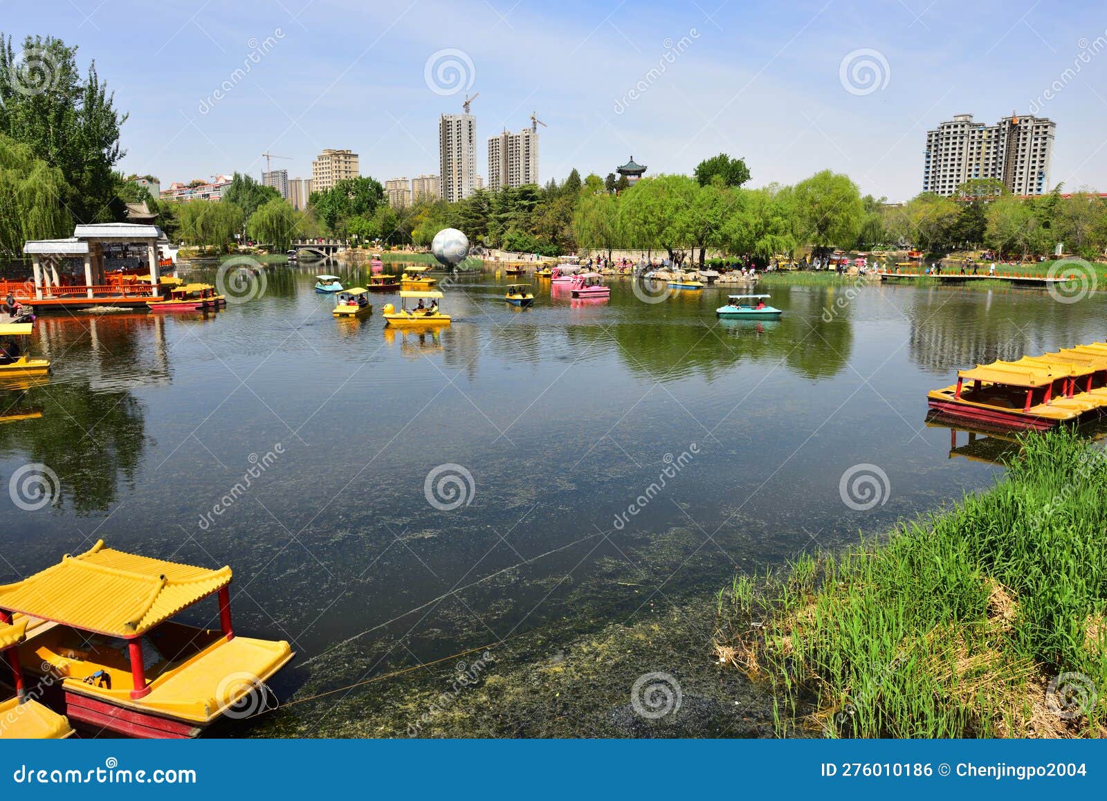 Spring outing in the park editorial photo. Image of bridge - 276010186