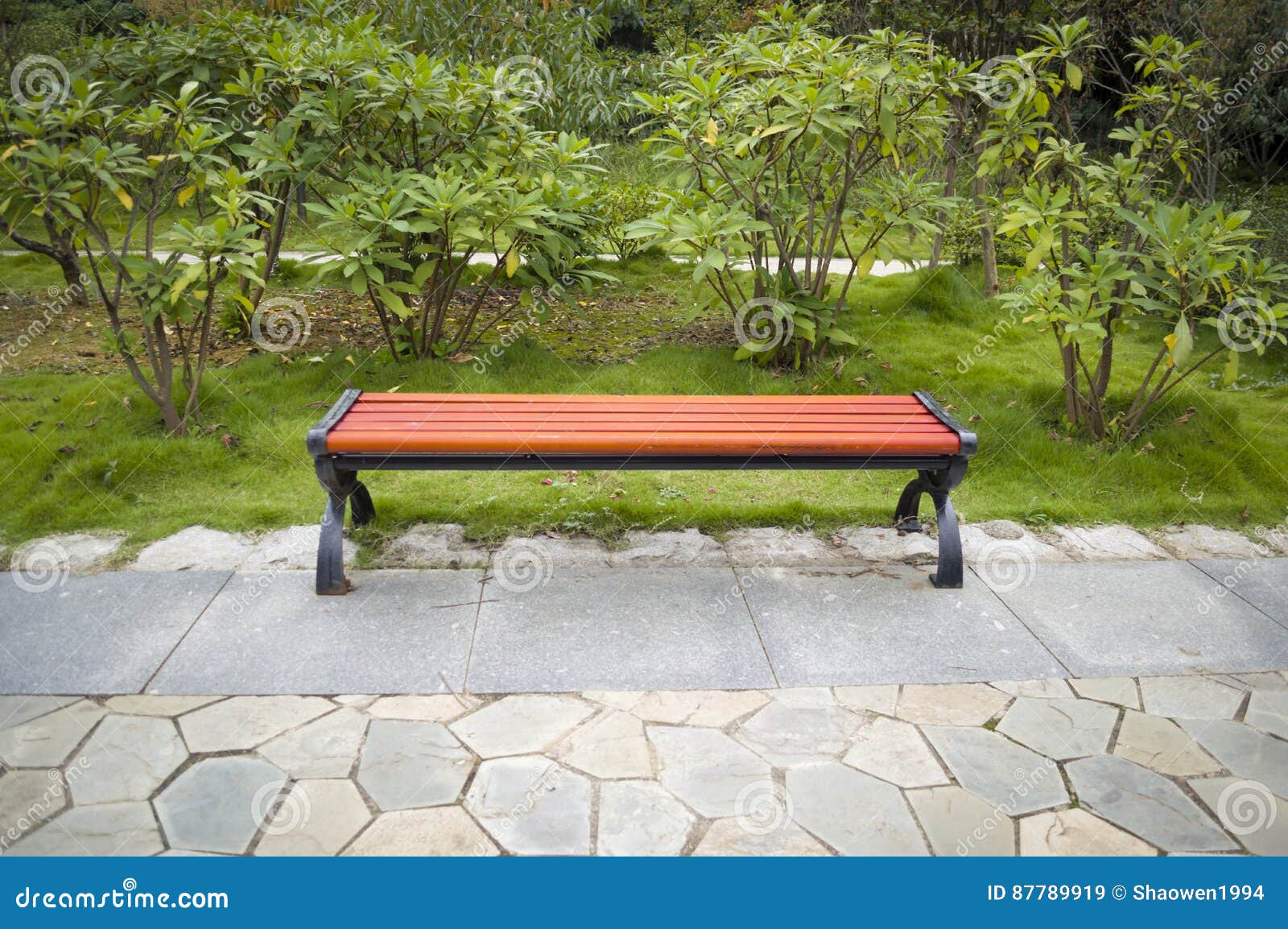 Spring Park Bench in Garden Stock Image - Image of garden, relaxation ...