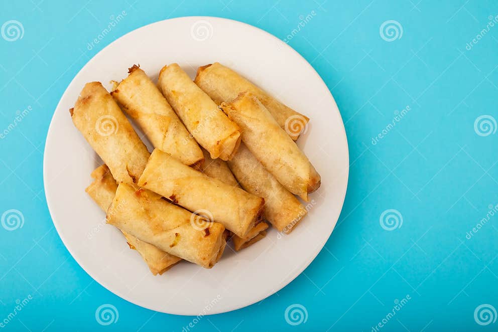 Spring Roll Also Known As Egg Roll on White Dish Stock Photo - Image of ...
