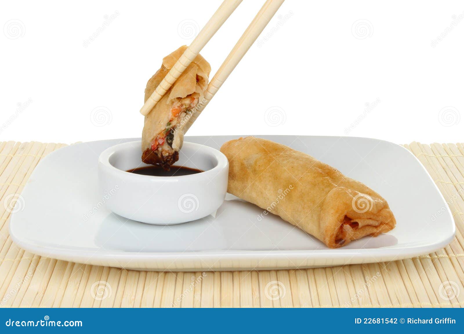 Spring roll in chopsticks stock photo. Image of chinese - 22681542