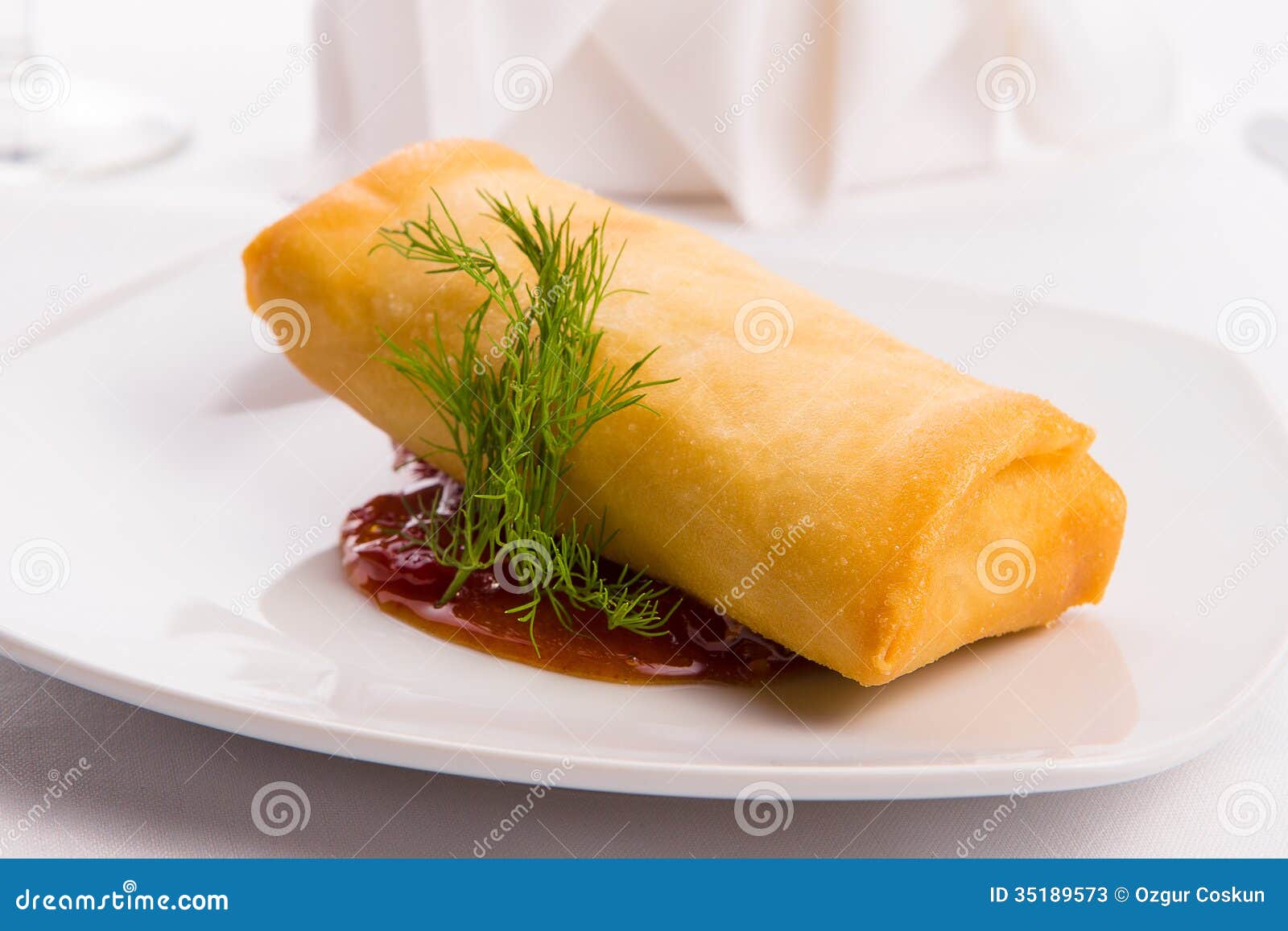 Spring Roll Elegantly Complimented with Dill and Served on Sweet Stock ...