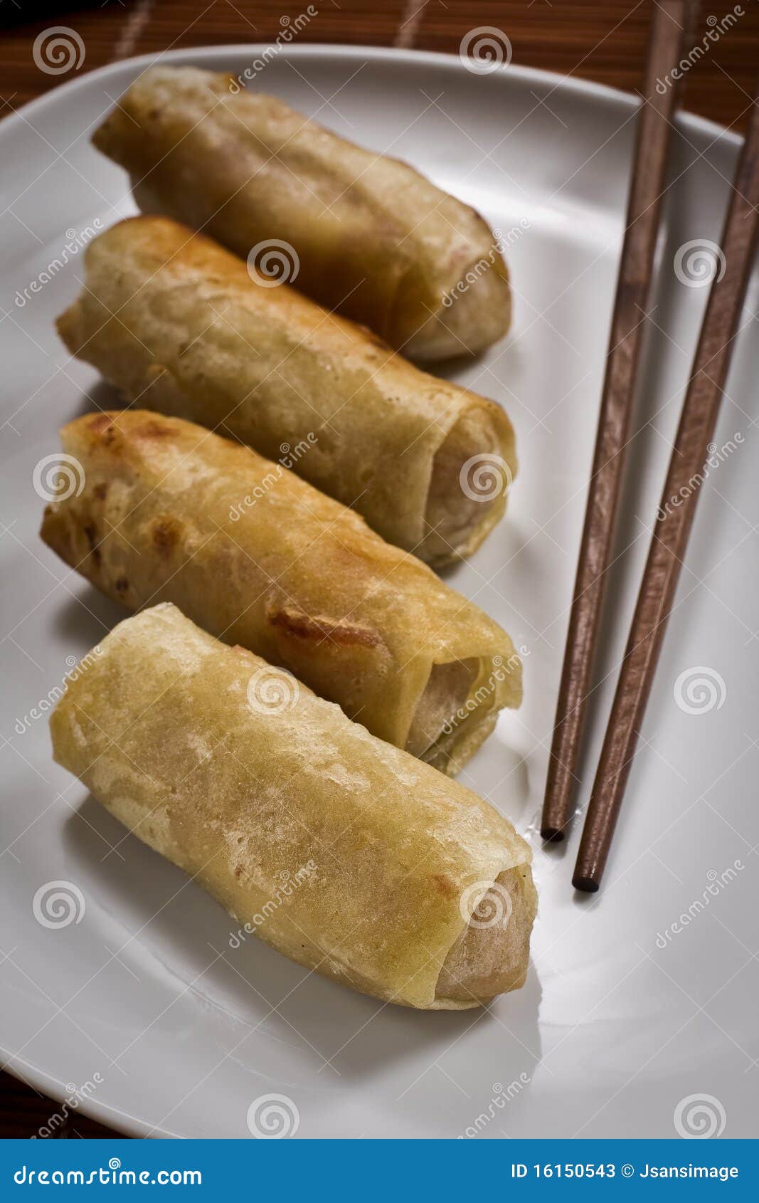 Four Spring Rolls in a Plate with Chopsticks . Stock Image - Image of ...