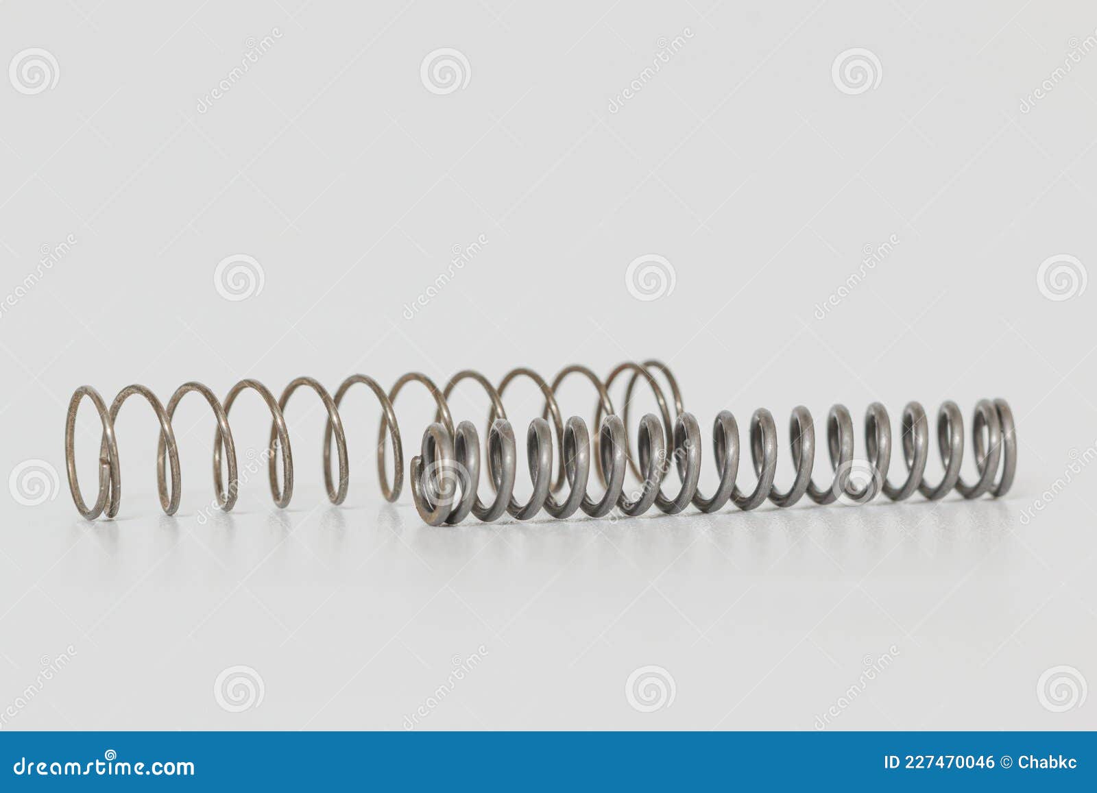 Spring steel push. stock photo. Image of extension, bounce - 227470046