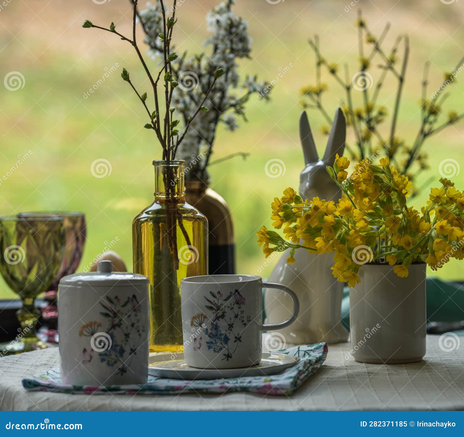 Spring Still Life with Yellow Primroses, an Apple Branch and a Cup ...