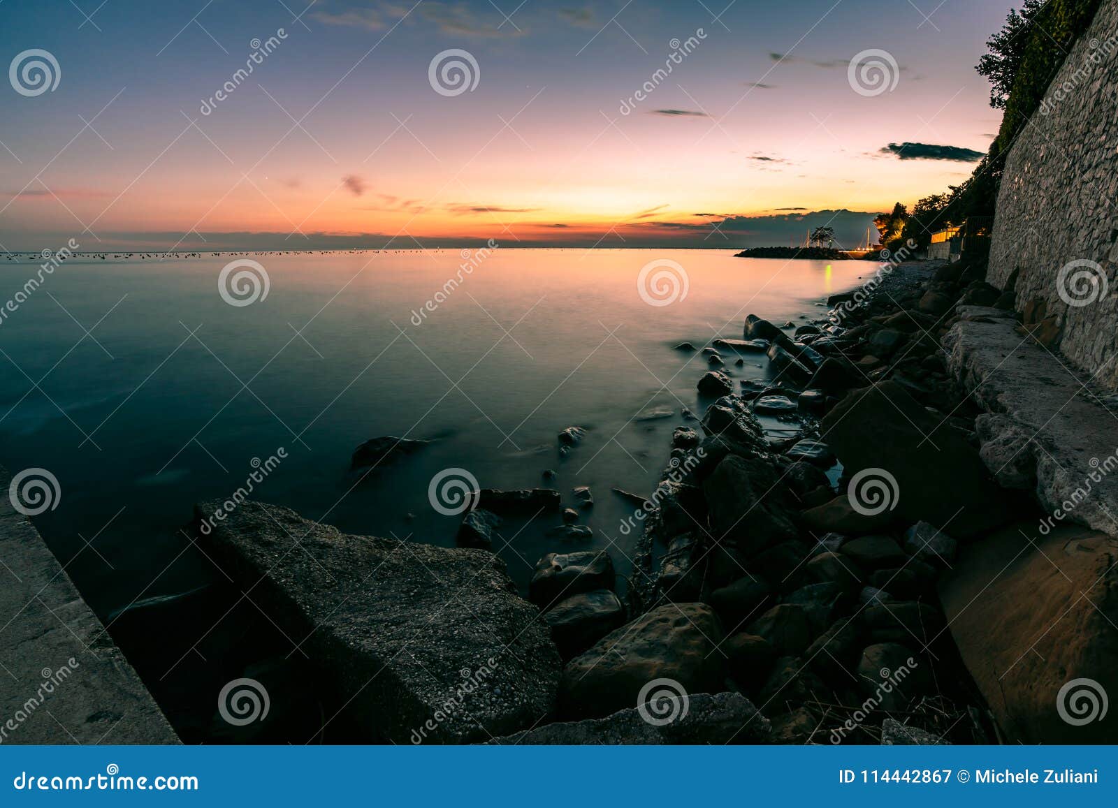 Sunset at the sea, Trieste stock image. Image of rocks - 114442867