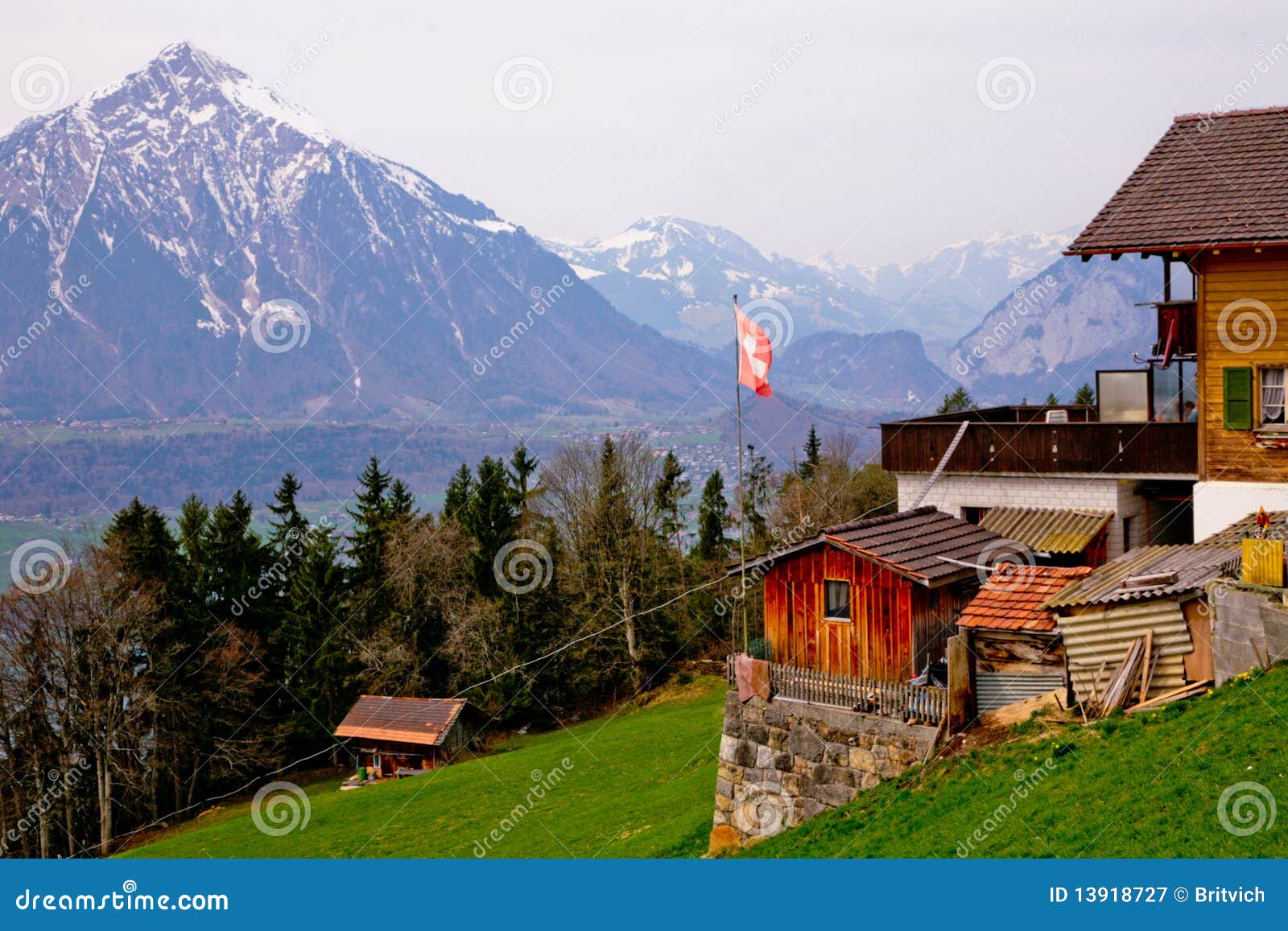 Spring in Swiss Alps stock image. Image of alpine, house - 13918727