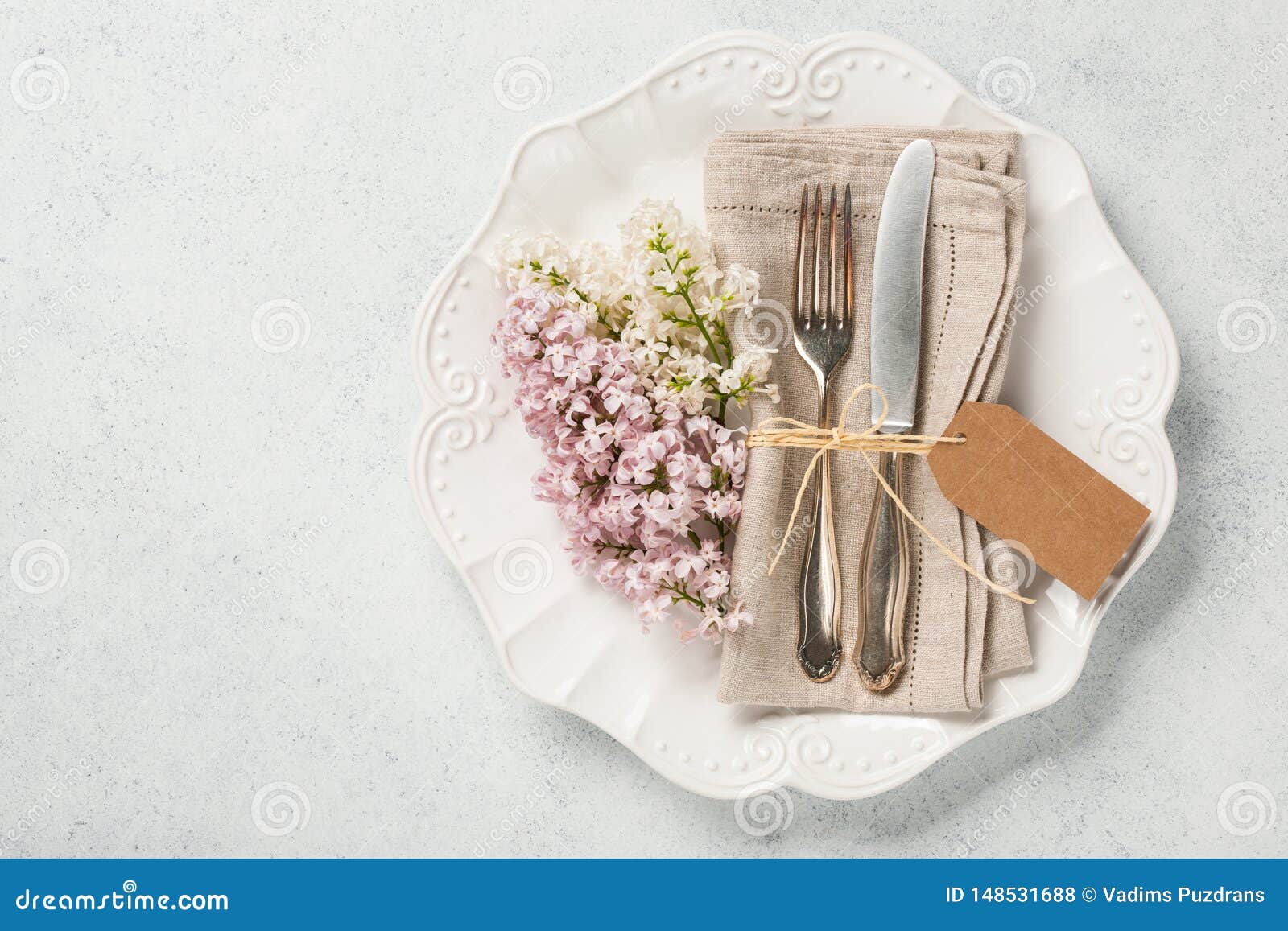 Spring table place setting stock photo. Image of flower - 148531688