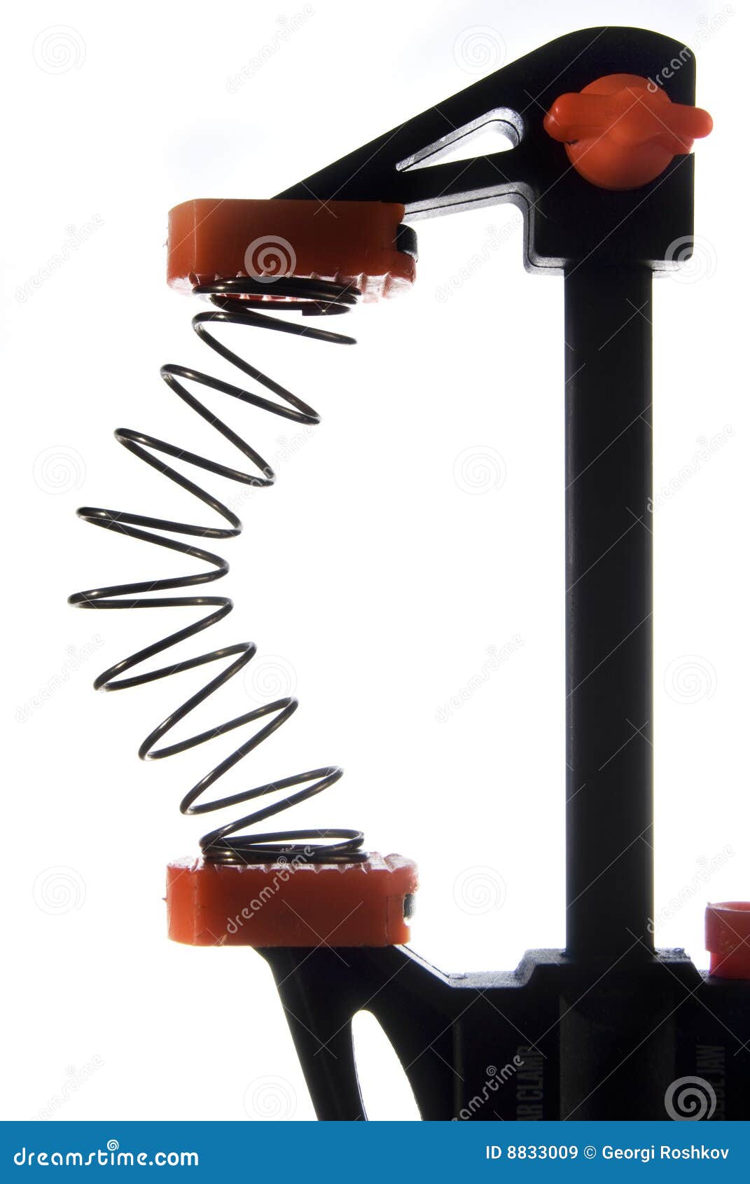Spring under tension stock image. Image of spiral, compressed - 8833009