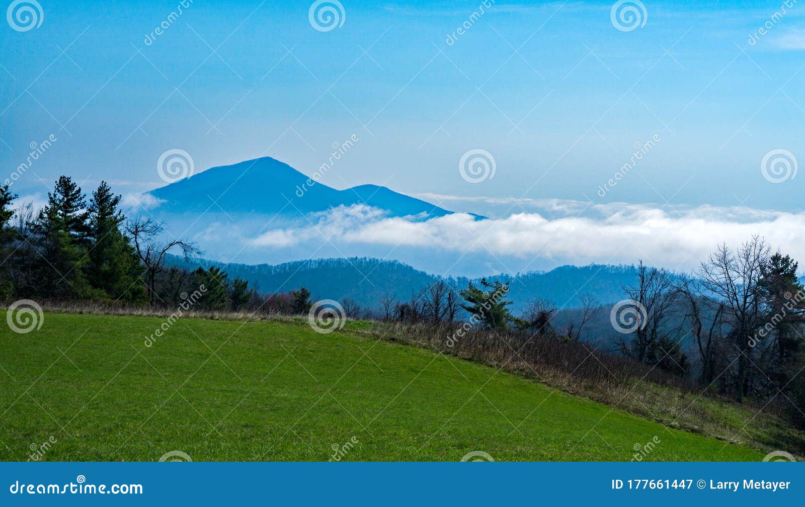 A Spring View of Devils Backbone and Valley Clouds Stock Image - Image ...