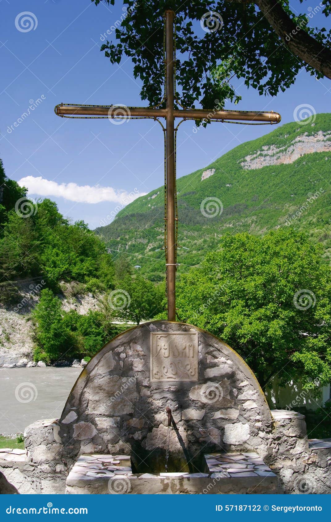 Spring water and a cross stock photo. Image of lake, religious - 57187122