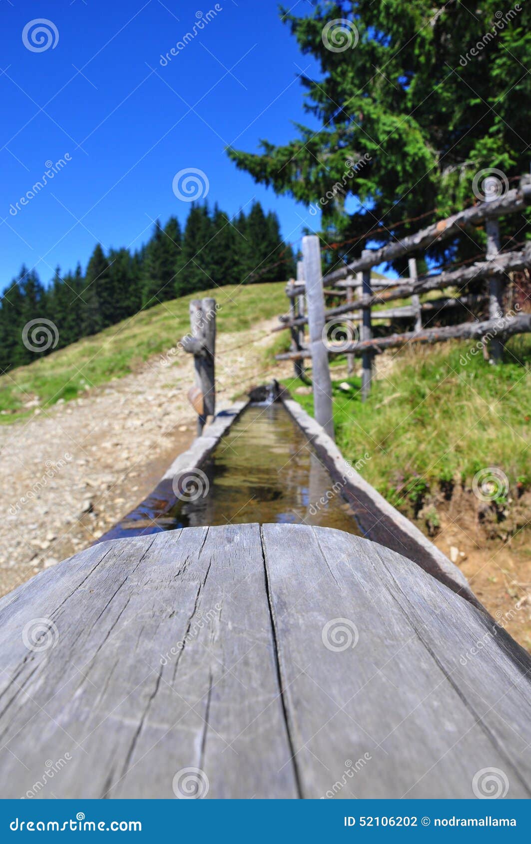 Spring Water in Wooden Well in the Alps Stock Photo - Image of ...