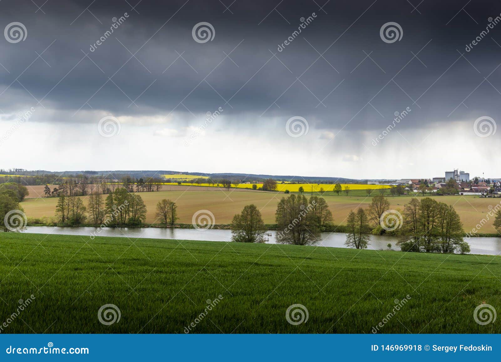 Springtime Countryside with Green Pasture and Sky with Clouds Stock ...
