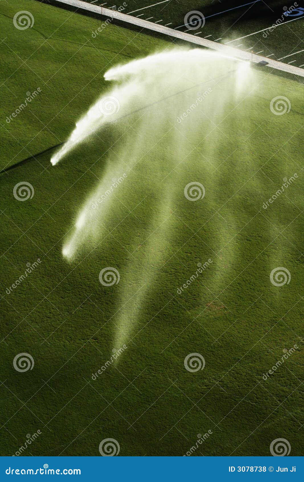 Sprinker in football field stock photo. Image of fountain - 3078738