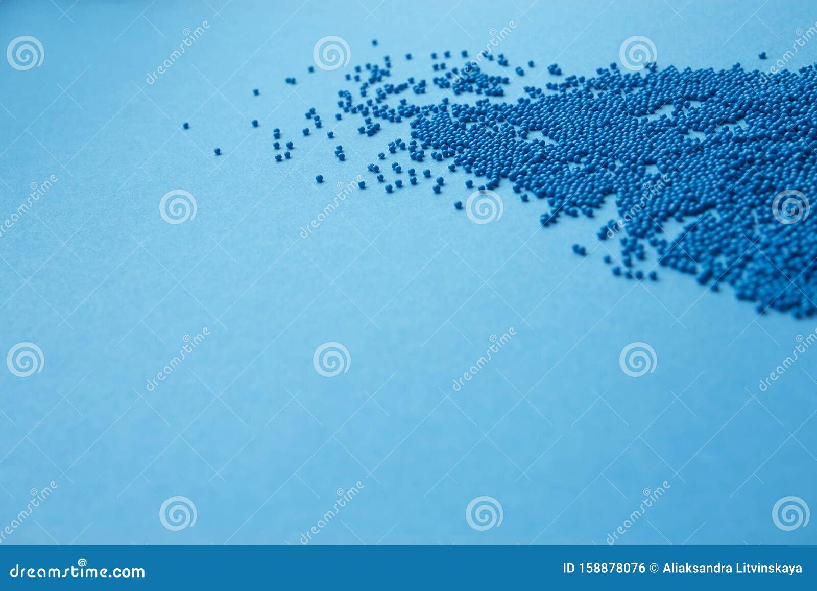 Sprinkle of Blue Balls on a Blue Background Stock Photo - Image of ...