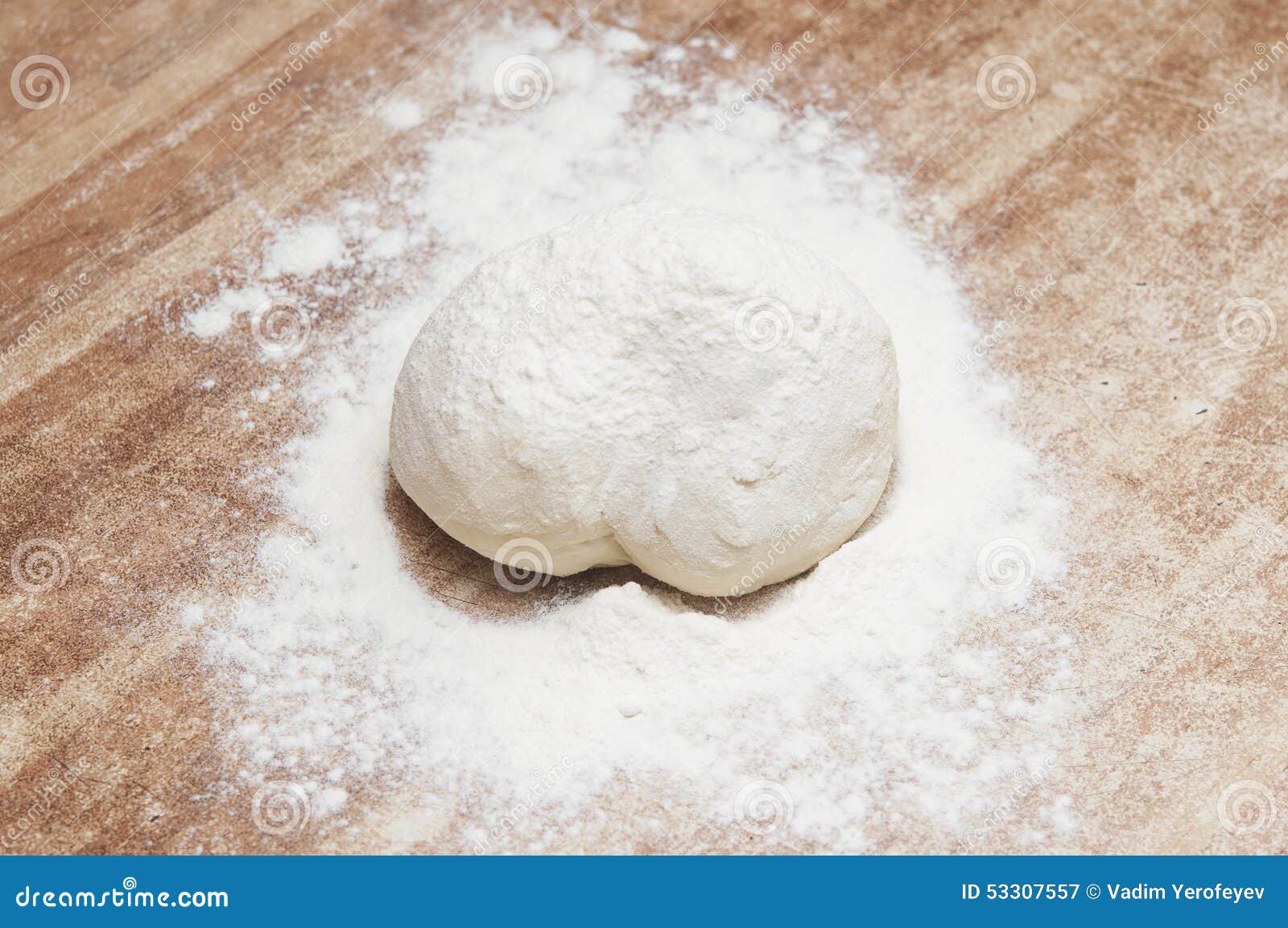 Sprinkle flour on dough stock image. Image of bakery - 53307557