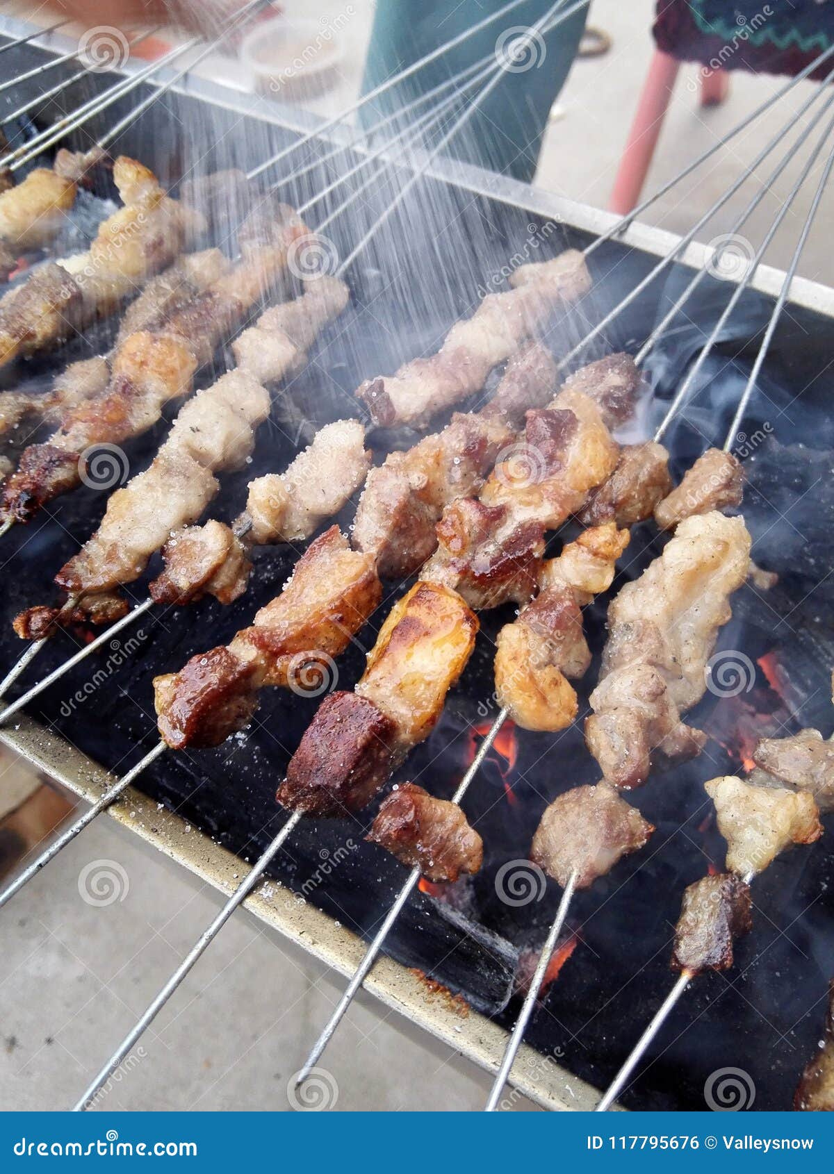 Sprinkle Salt on the Meat Skewers Stock Photo - Image of grilled, bake ...