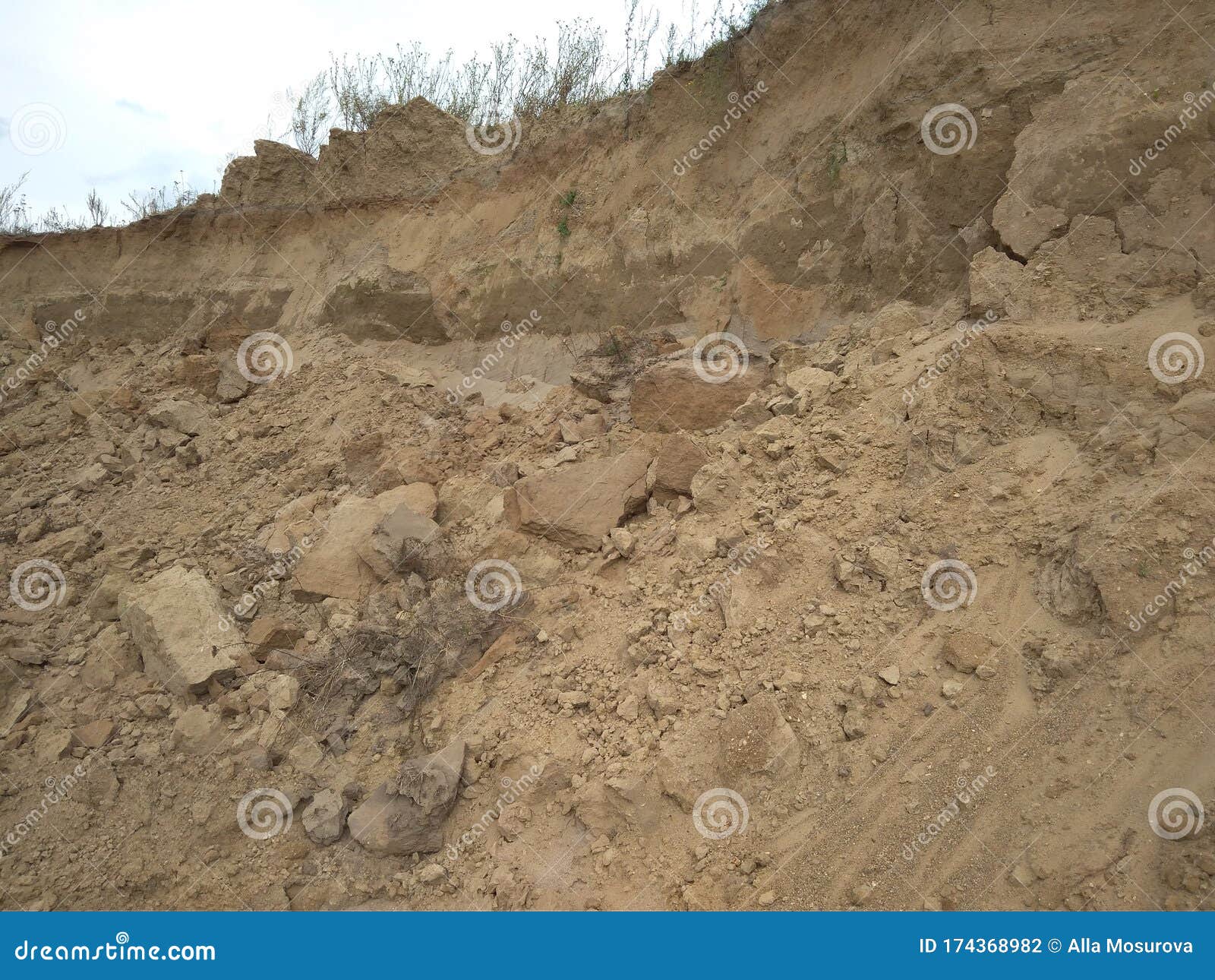 Sprinkled on the Loose Soil Clay Soil with Stones in the Excavated Pit ...