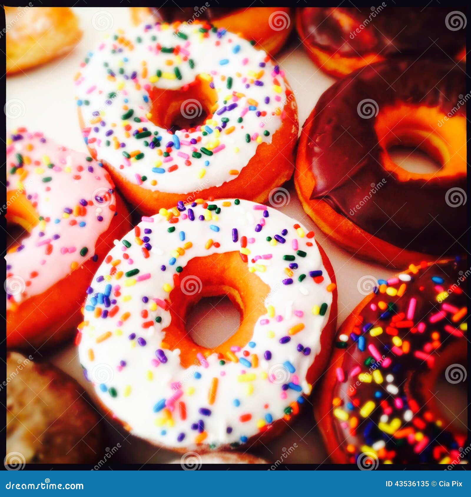 Sprinkled ring donuts stock image. Image of closeup, covered - 43536135