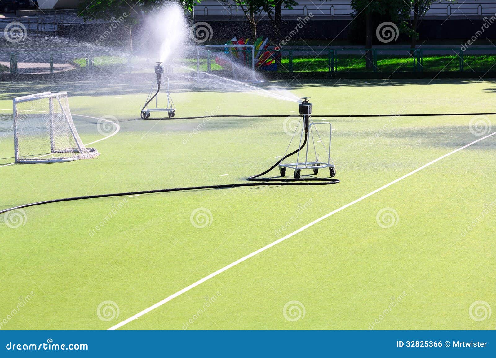 Sprinkler Watering a Artificial Stock Photo - Image of football ...