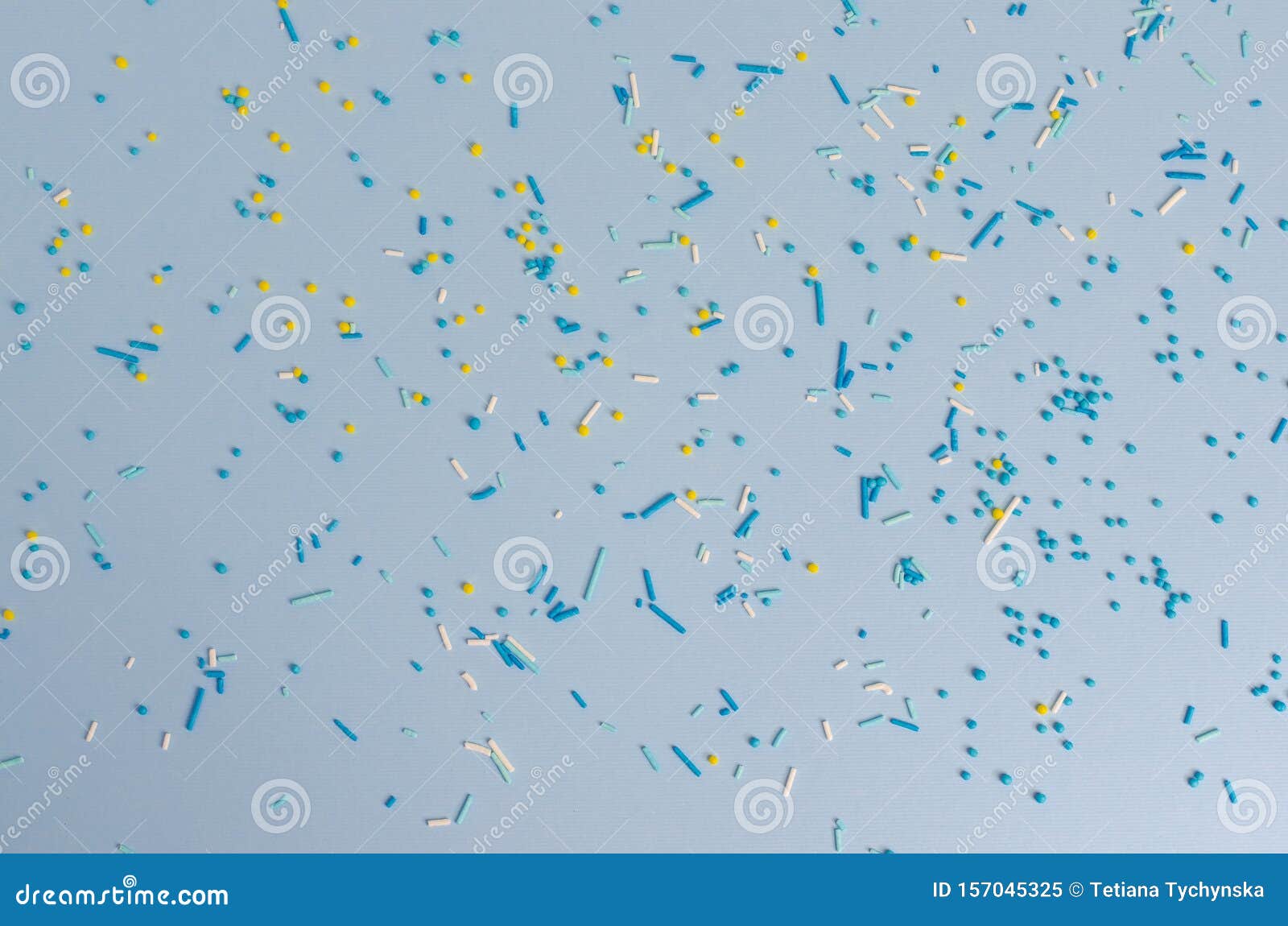 Sprinkles on Blue Background. Texture and Background Concept Stock ...