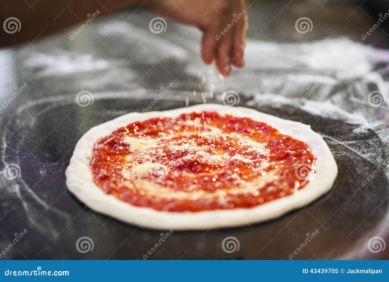 Sprinkling Cheese on Home Made Pizza Stock Image - Image of european ...