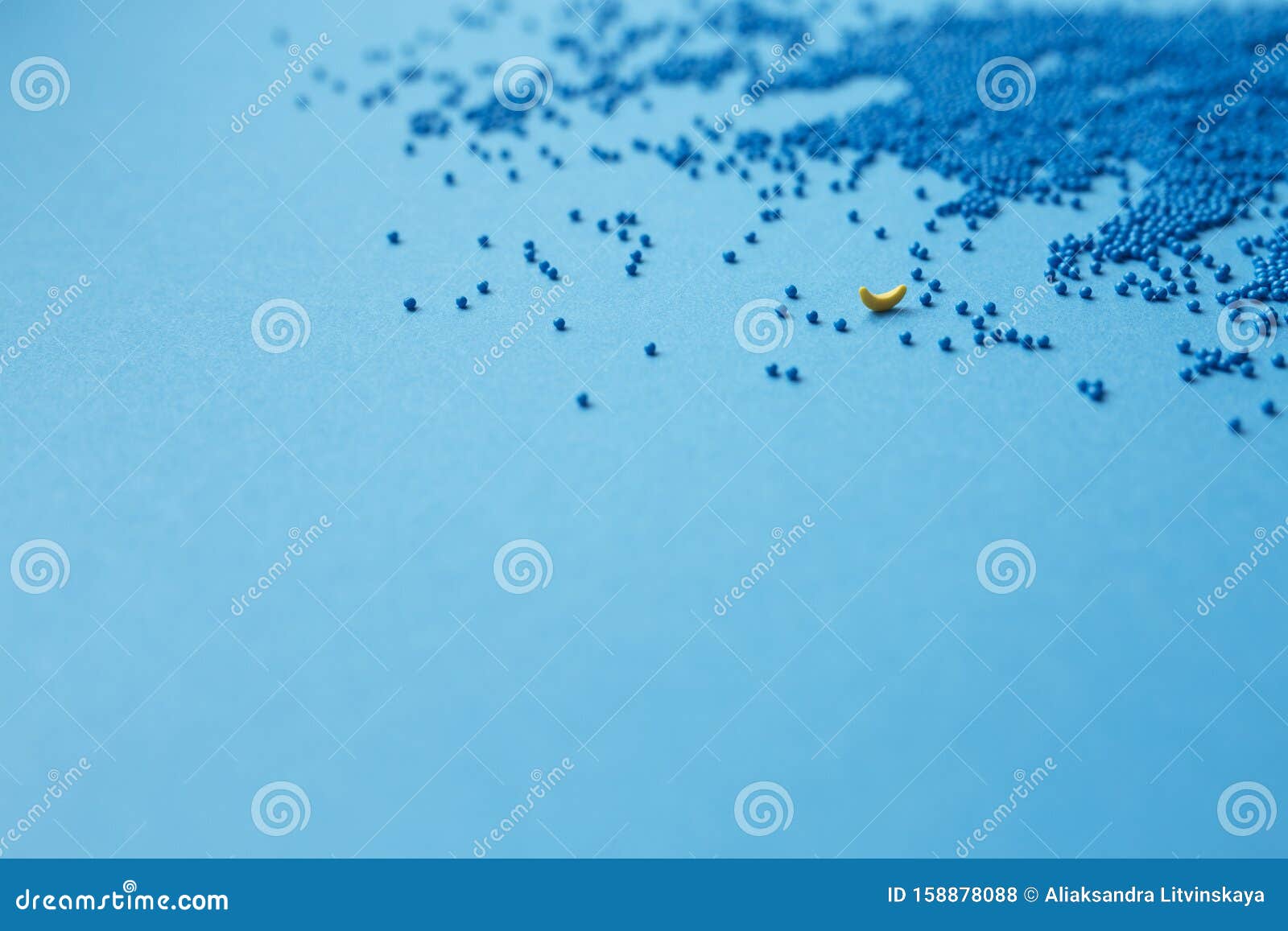 Sprinkle of Blue Balls on a Blue Background Stock Photo - Image of ...